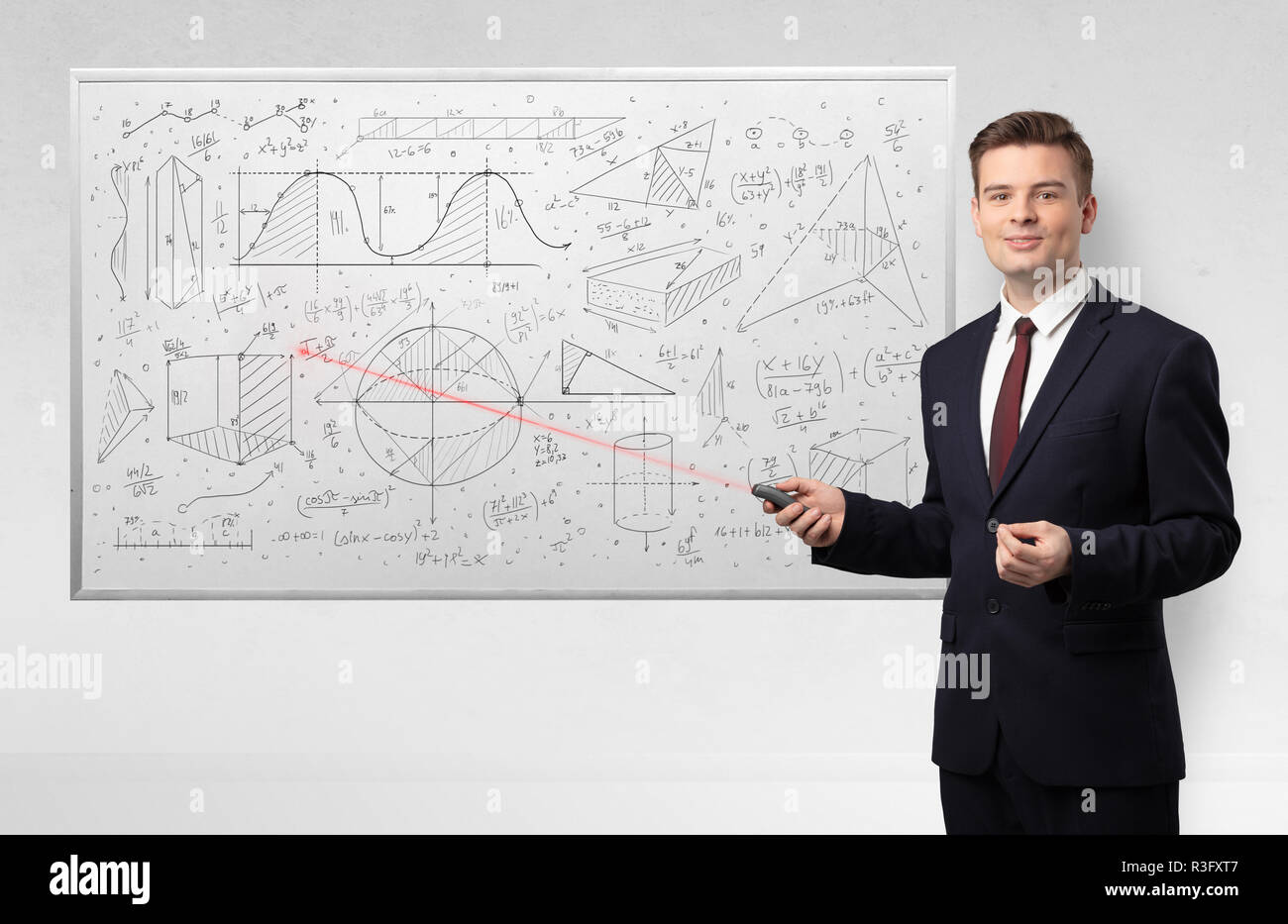 Professor with laser pointer teaching geometry Stock Photo - Alamy