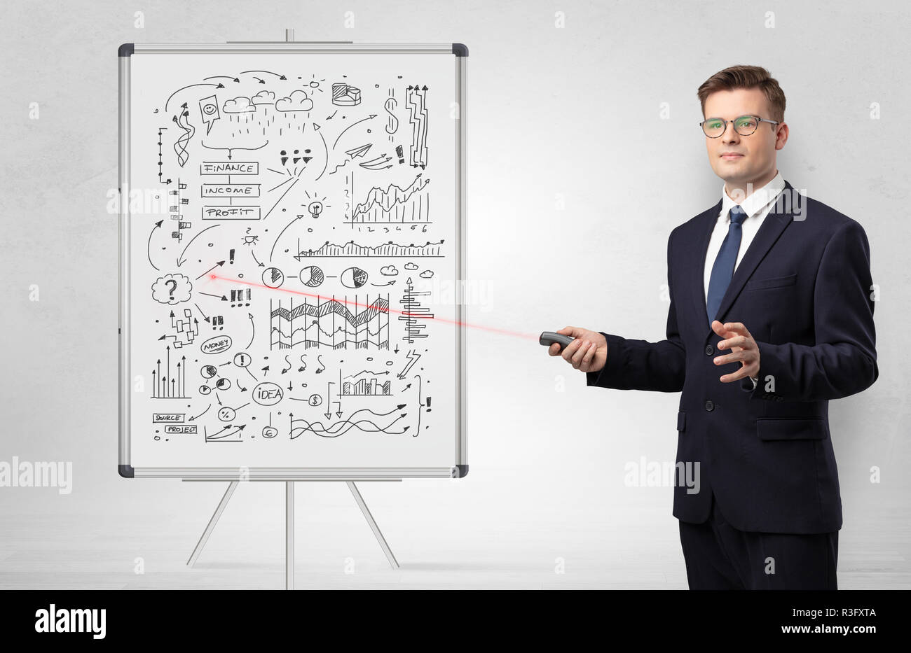 Professor with laser pointer teaching business theories Stock Photo - Alamy