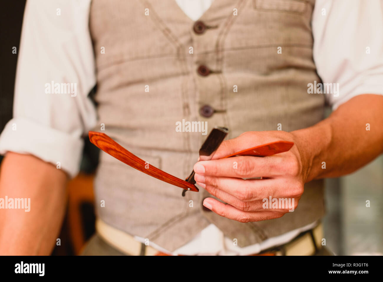 Barber preparing to shave a client Stock Photo - Alamy