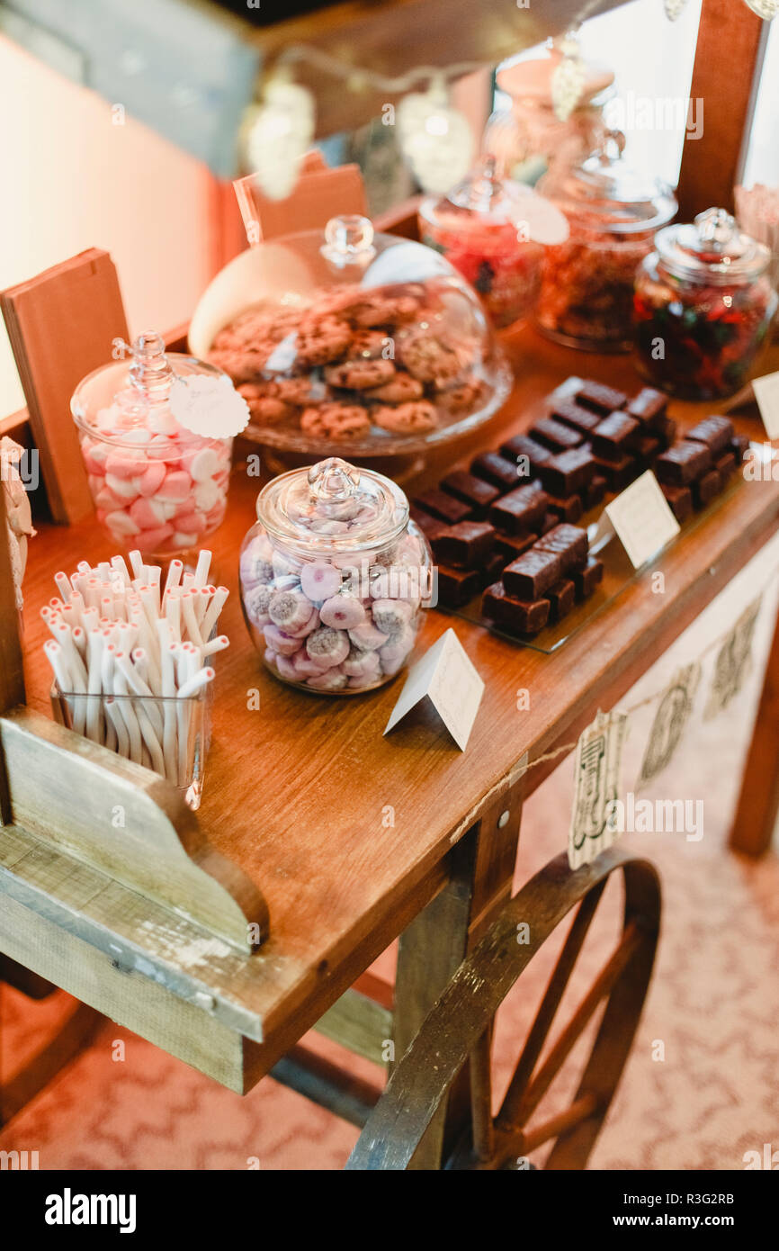 Elegant candy bar for a wedding full of pastries Stock Photo - Alamy