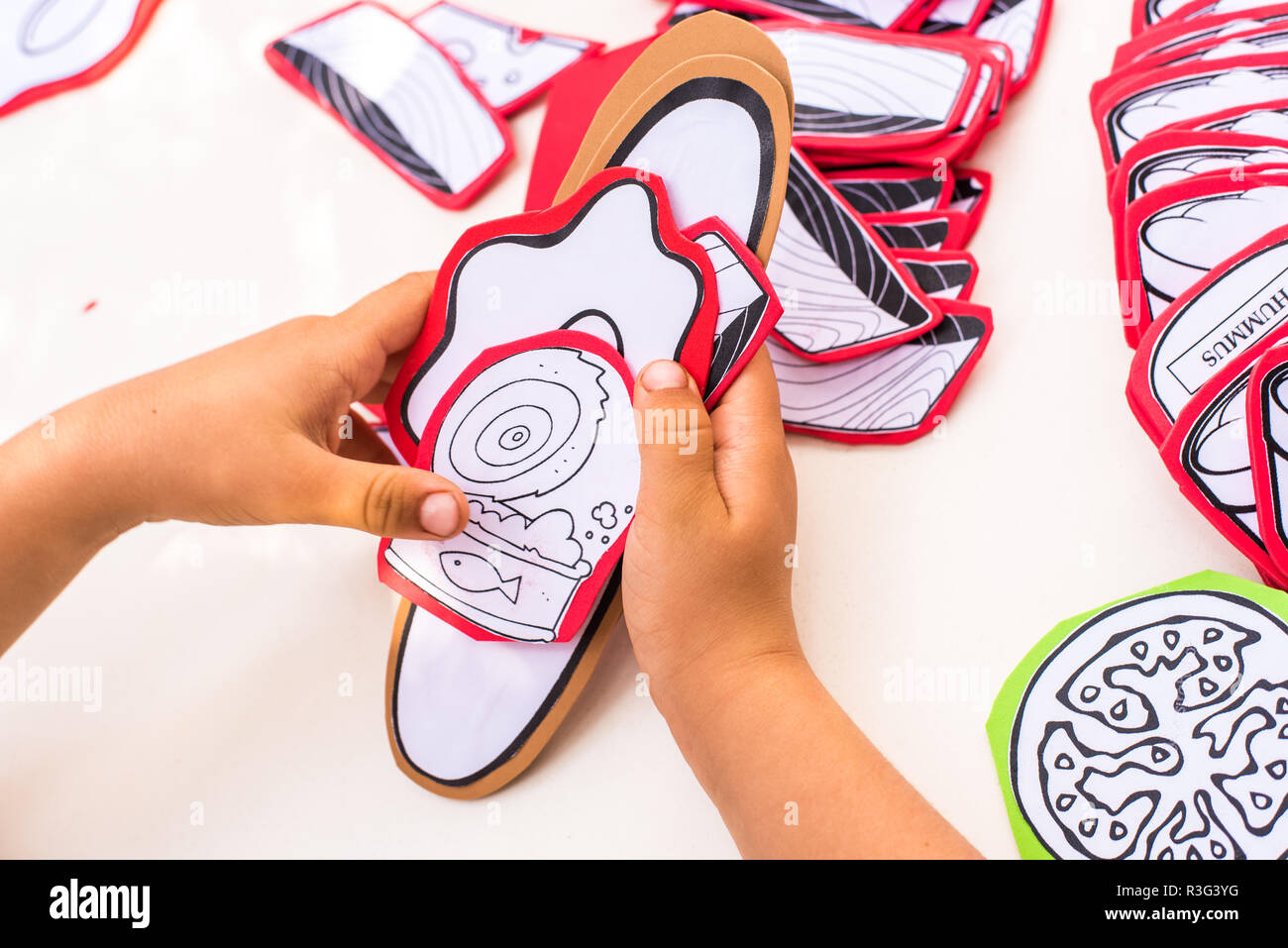 hands of child doing crafts Stock Photo - Alamy