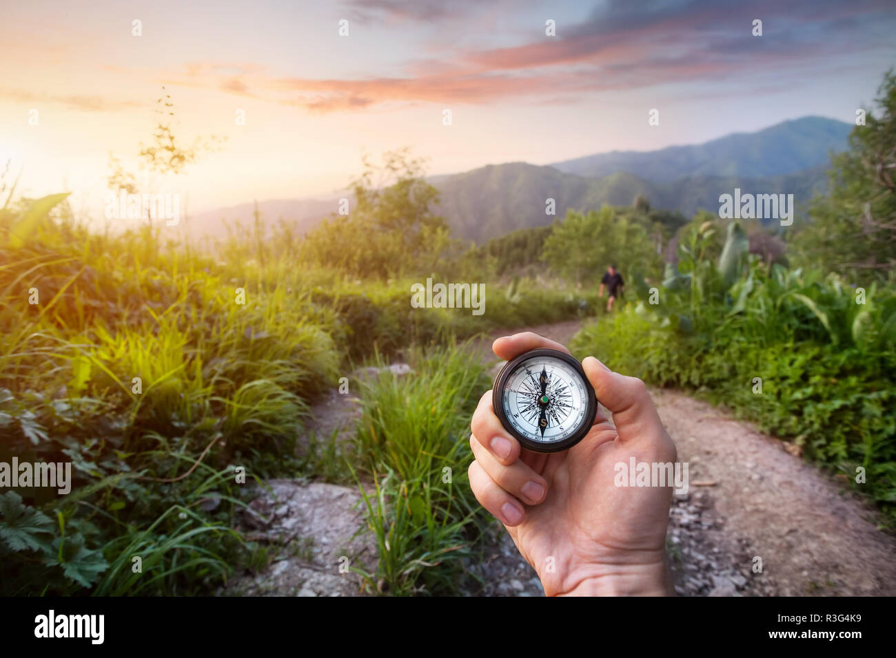 Hand with compass hi-res stock photography and images - Alamy