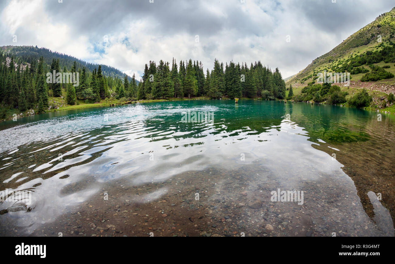 Mountain Saint lake in Gregory gorge in Kyrgyzstan, Central Asia Stock ...