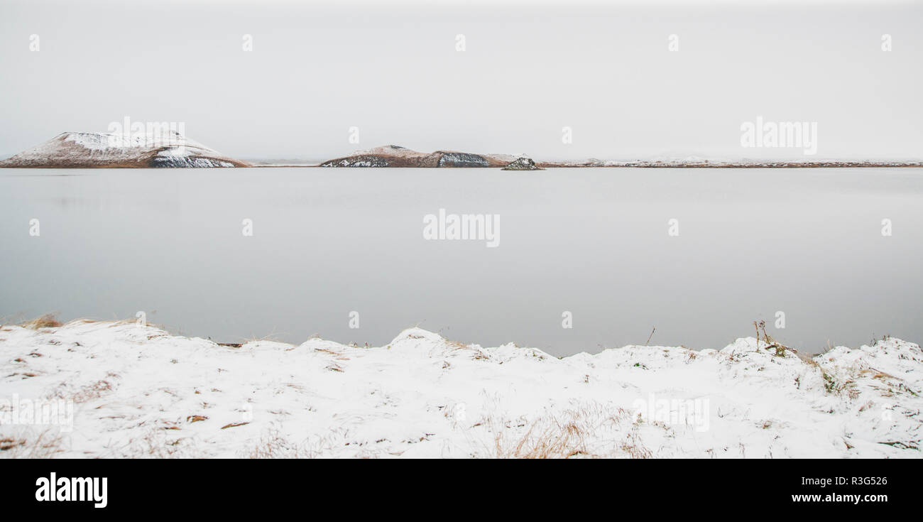 Icelandic landscapes full of green grass, sea and blue sky Stock Photo ...