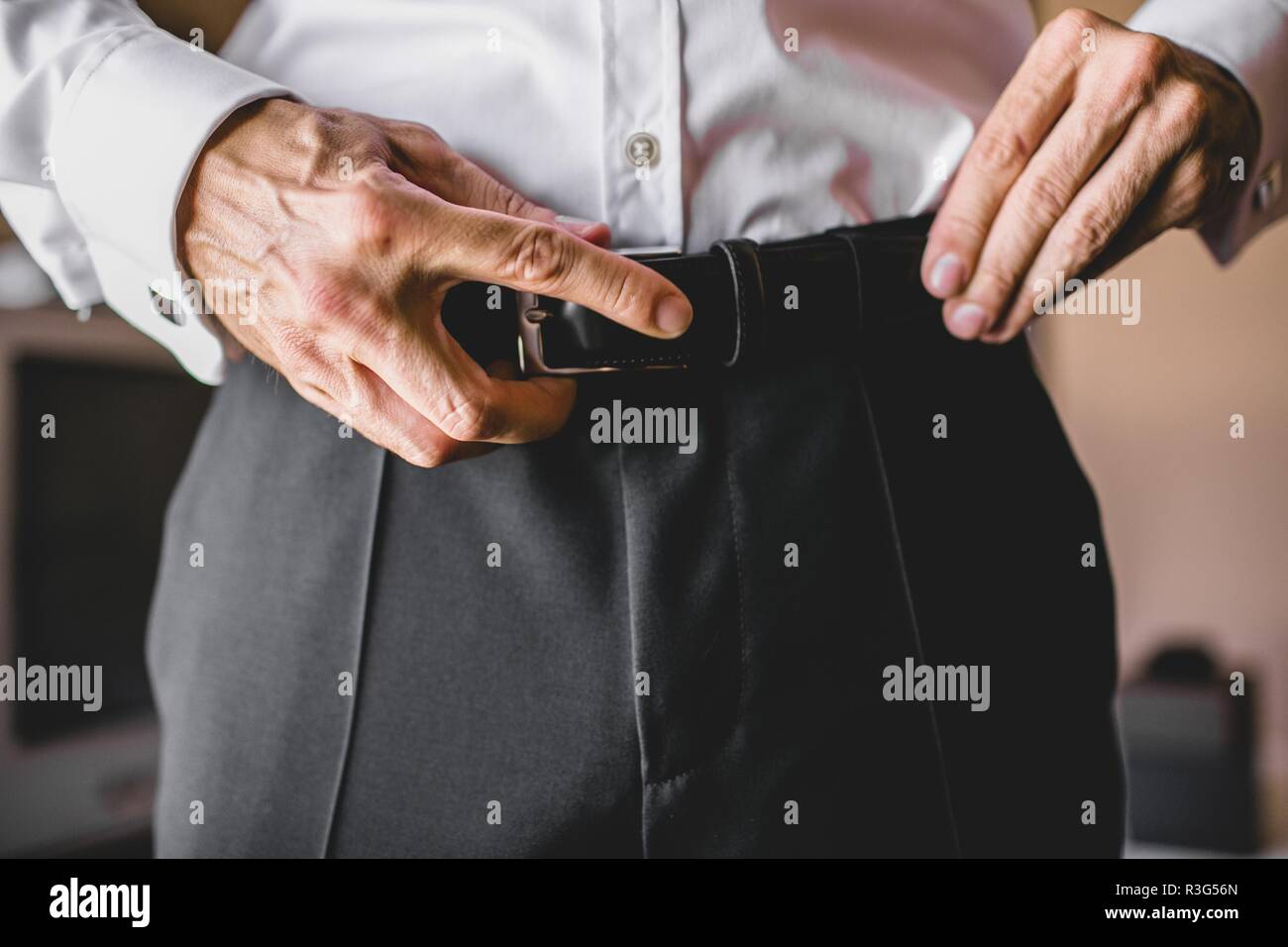 Black elegant business man belt Stock Photo - Alamy