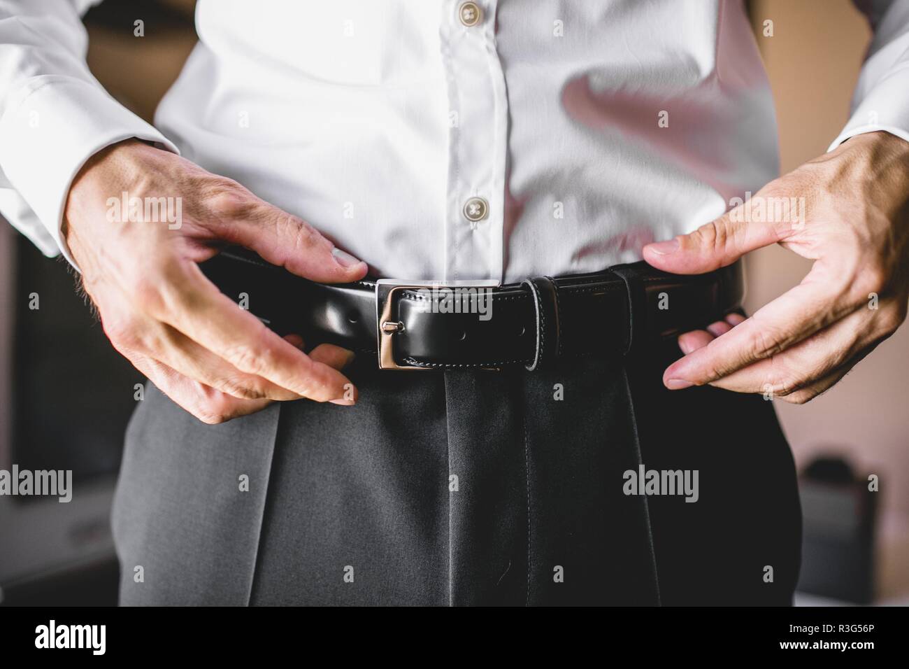 Black elegant business man belt Stock Photo - Alamy