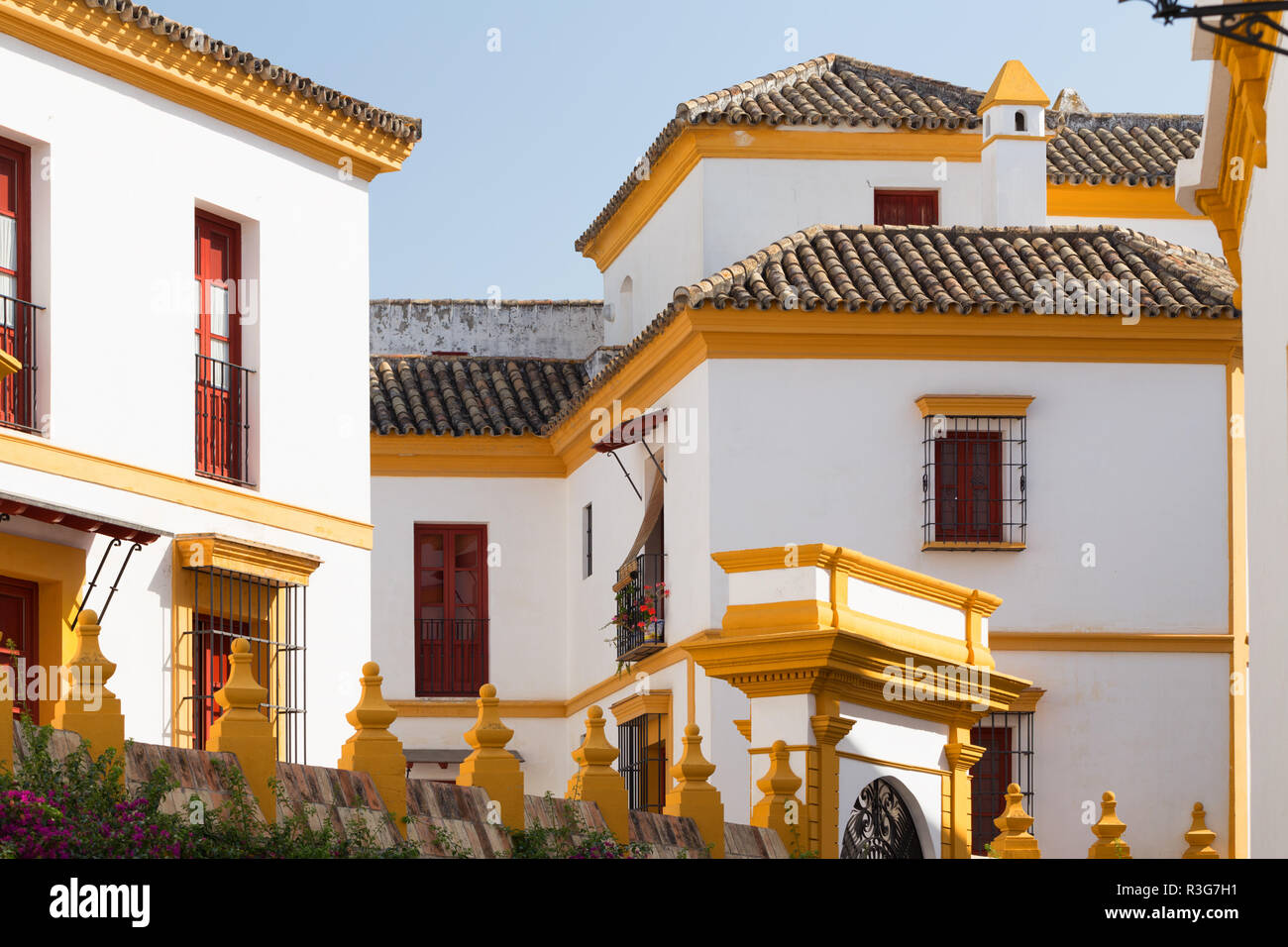 Seville in Spain. Traditional colors of the city, white and yellow ...