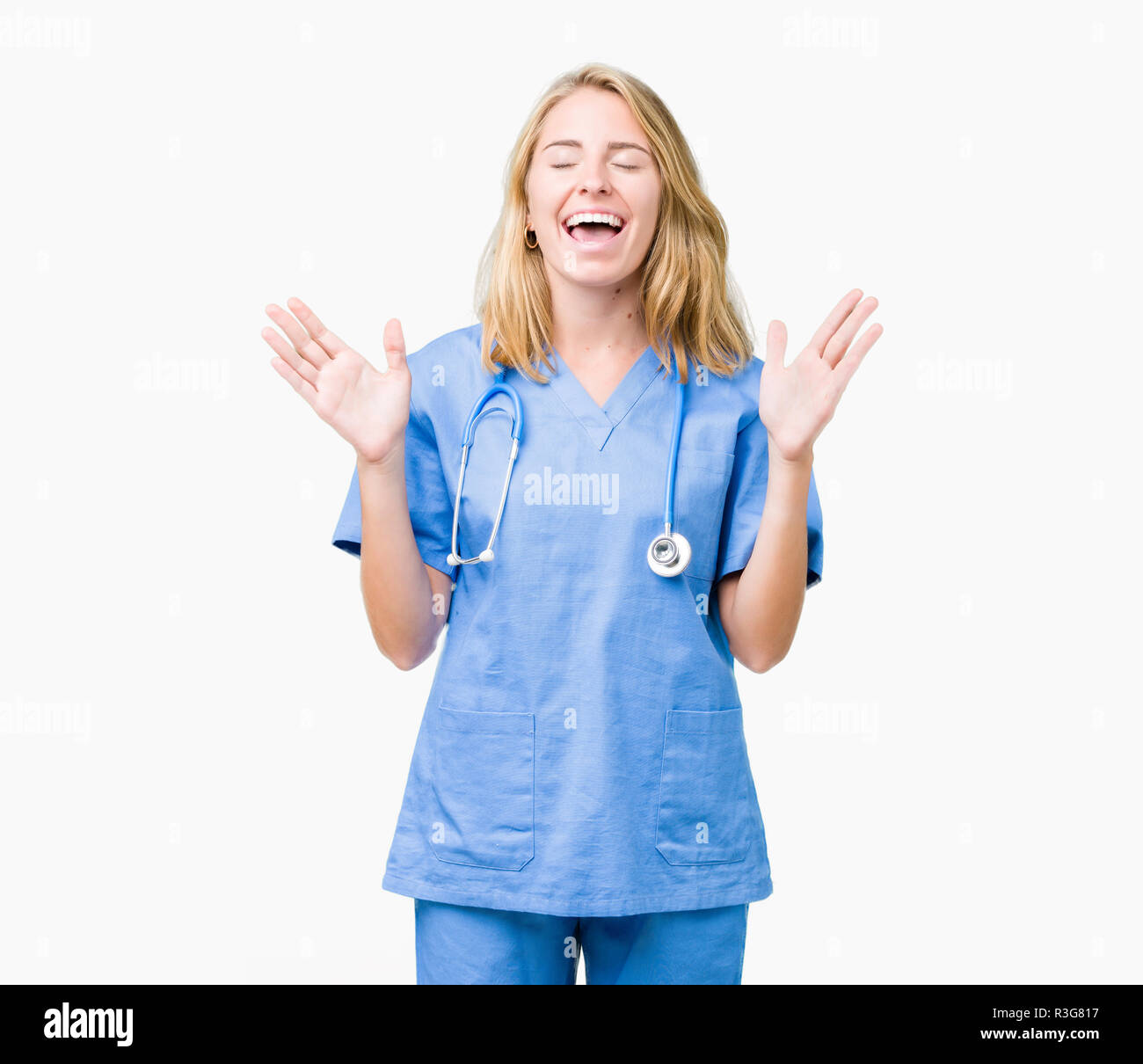 Beautiful young doctor woman wearing medical uniform over isolated ...