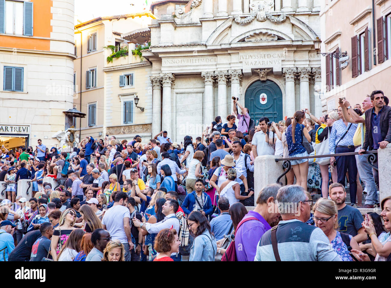 Tourists crowd around the Trevi fountain in the centre of Rome,Lazio ...