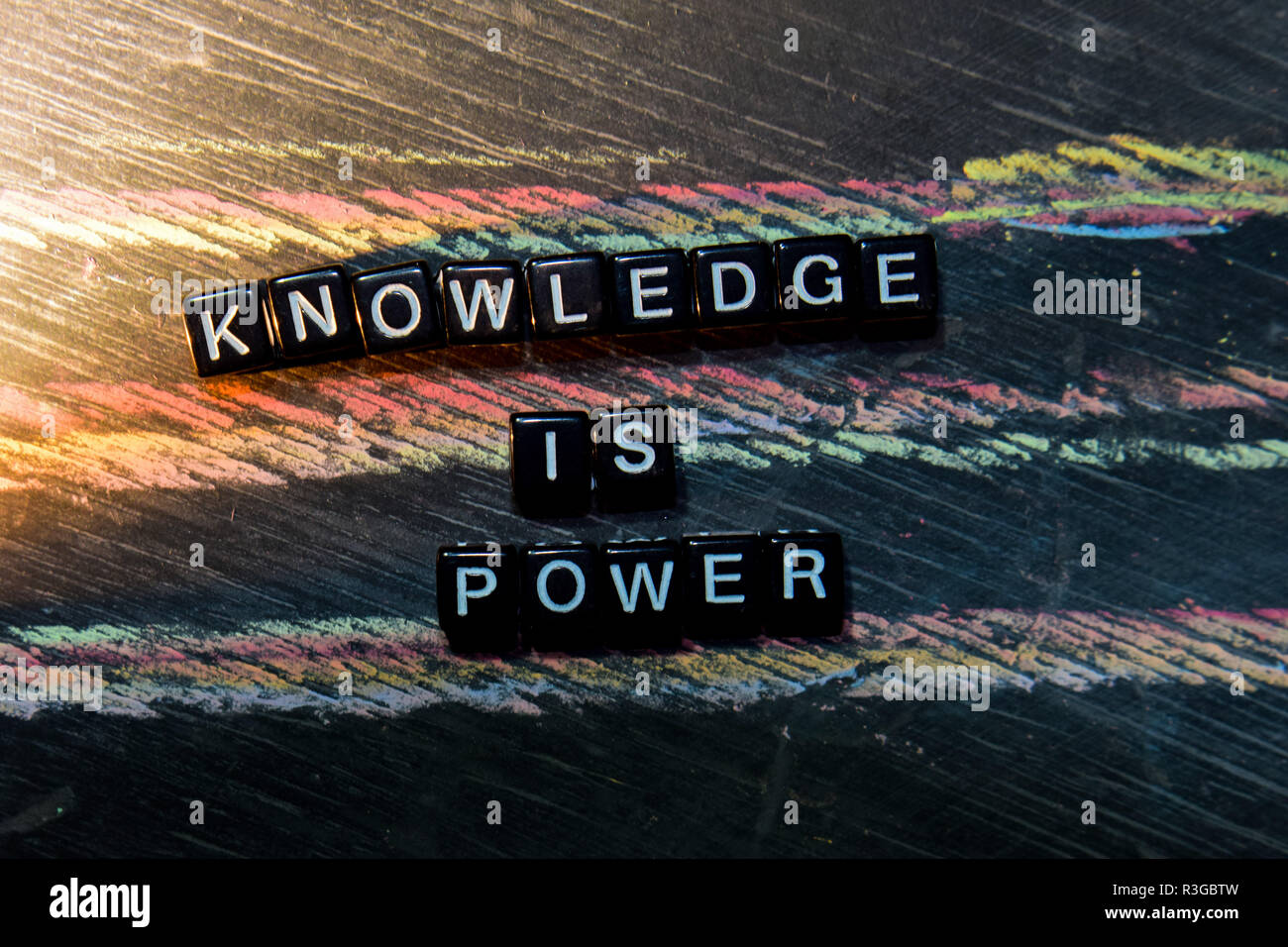Knowledge is Power on wooden blocks. Cross processed image with ...