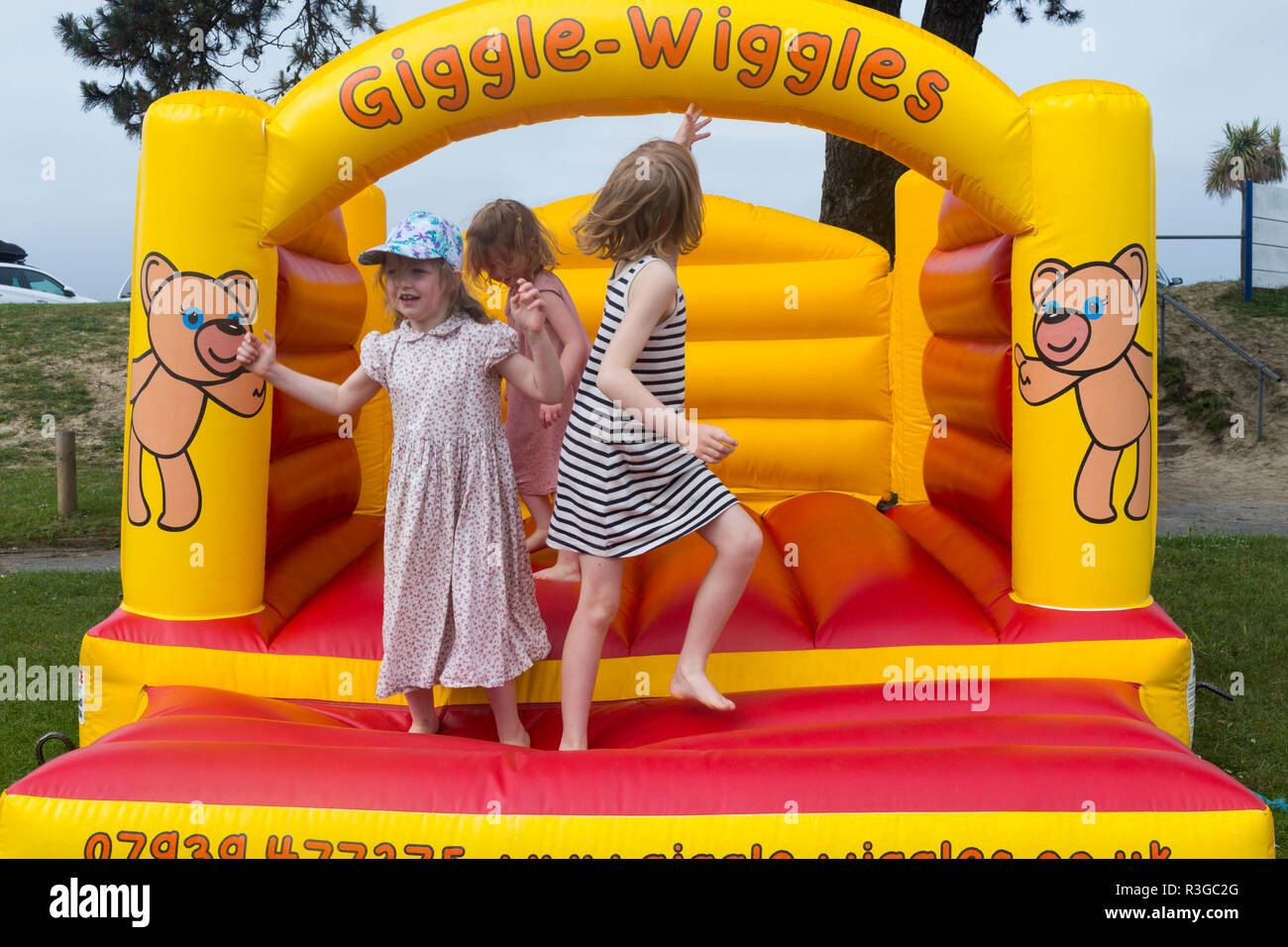 Children bouncy castle garden hi-res stock photography and images - Alamy