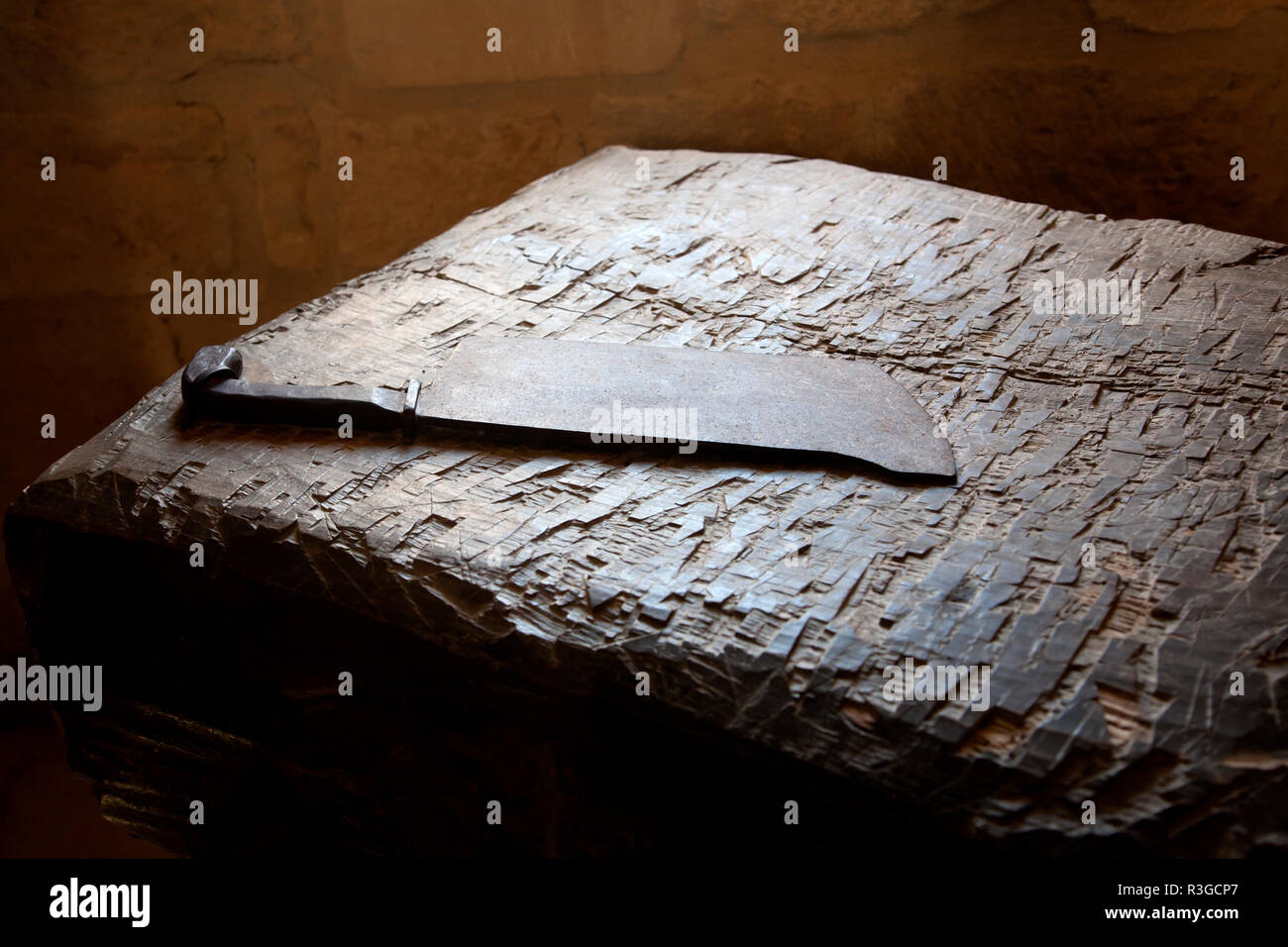 rusty meat cleaver on an old and well worn butcher's block Stock Photo ...
