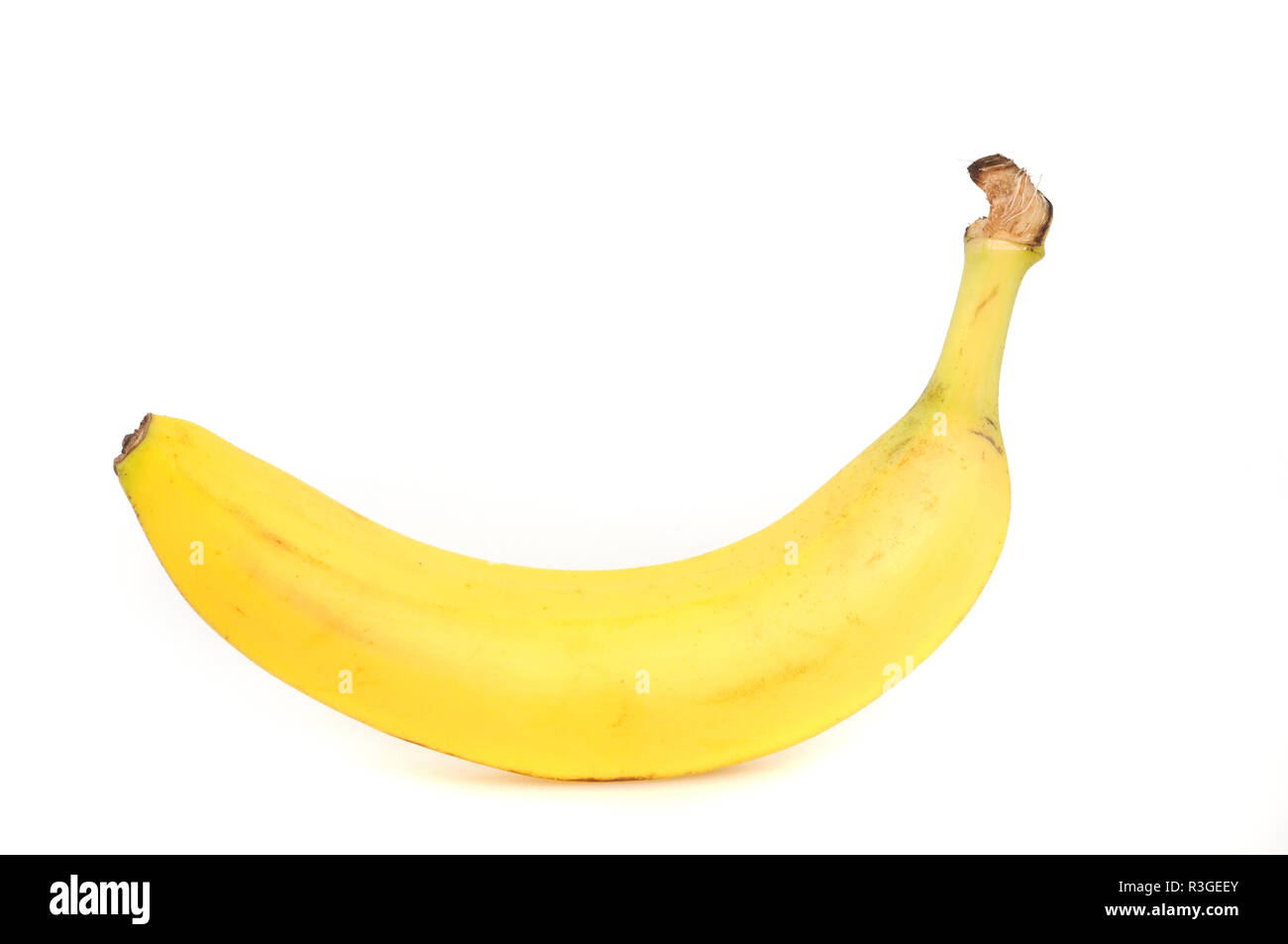 Curved banana Cut Out Stock Images & Pictures - Alamy