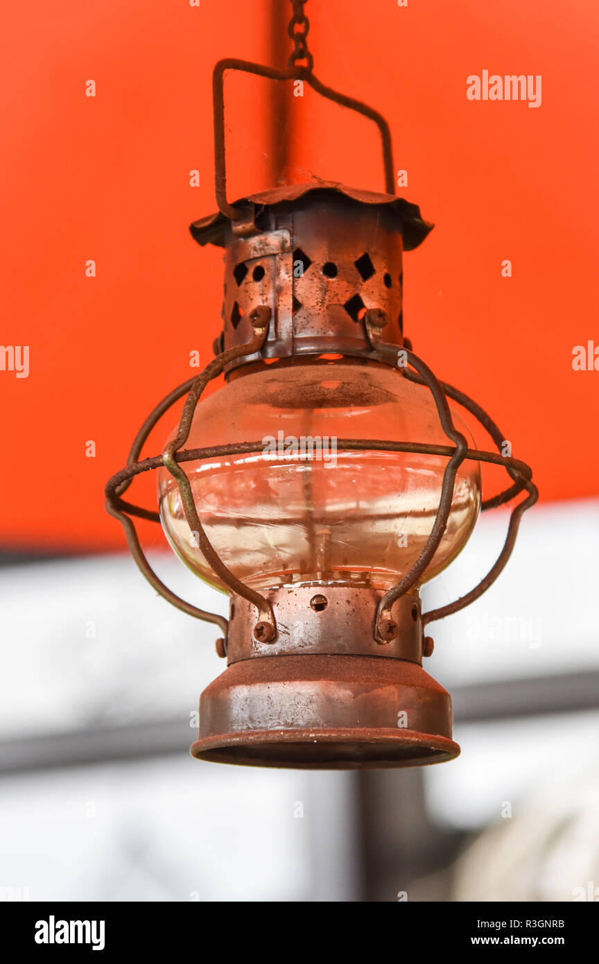 Old lantern hang the roof with orange background - lamp Vintage lantern ...