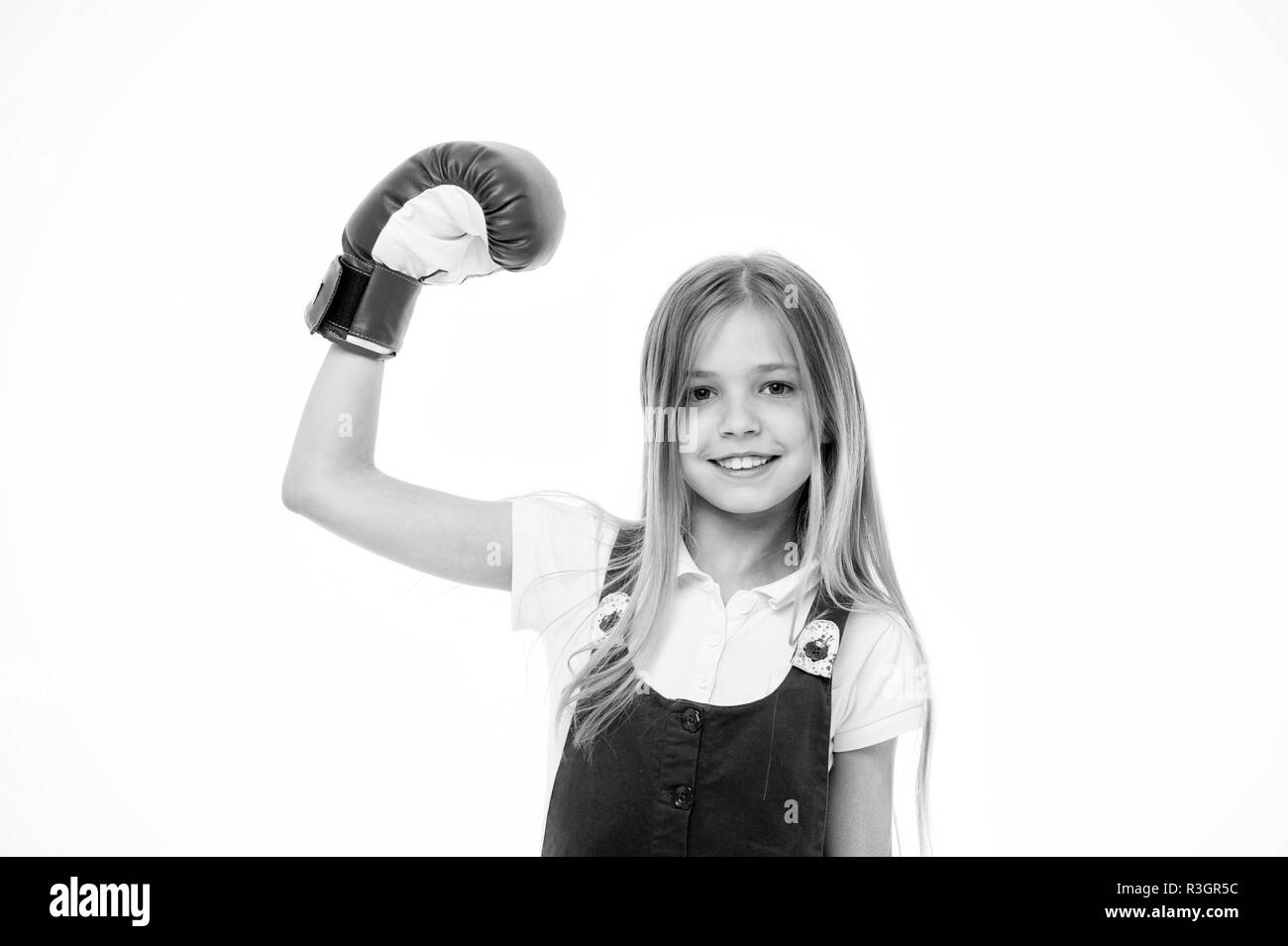 Girl on smiling face posing with boxing glove, isolated on white ...