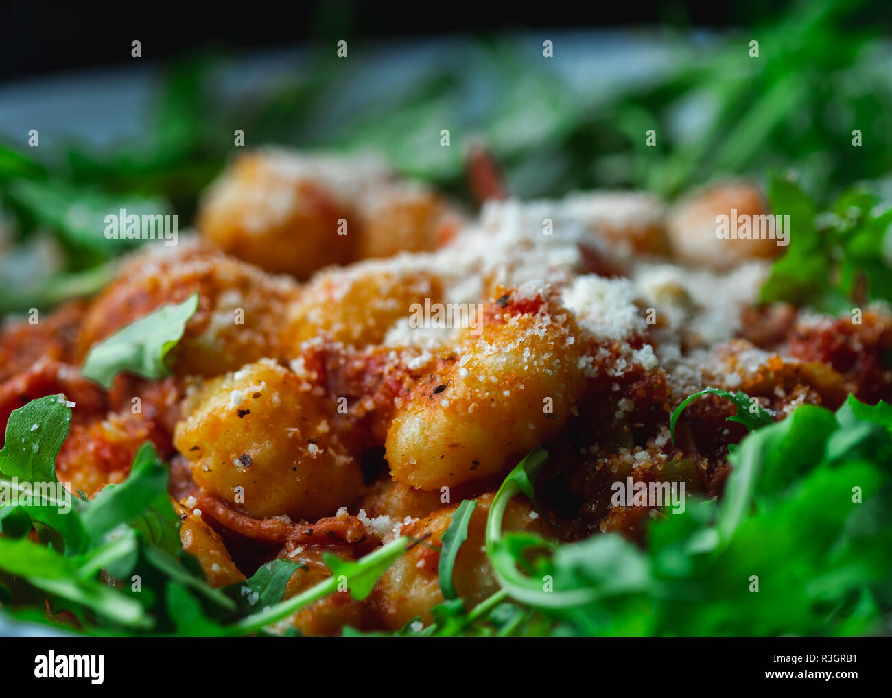 Gnocchi with tomato saouce and cheese Stock Photo - Alamy
