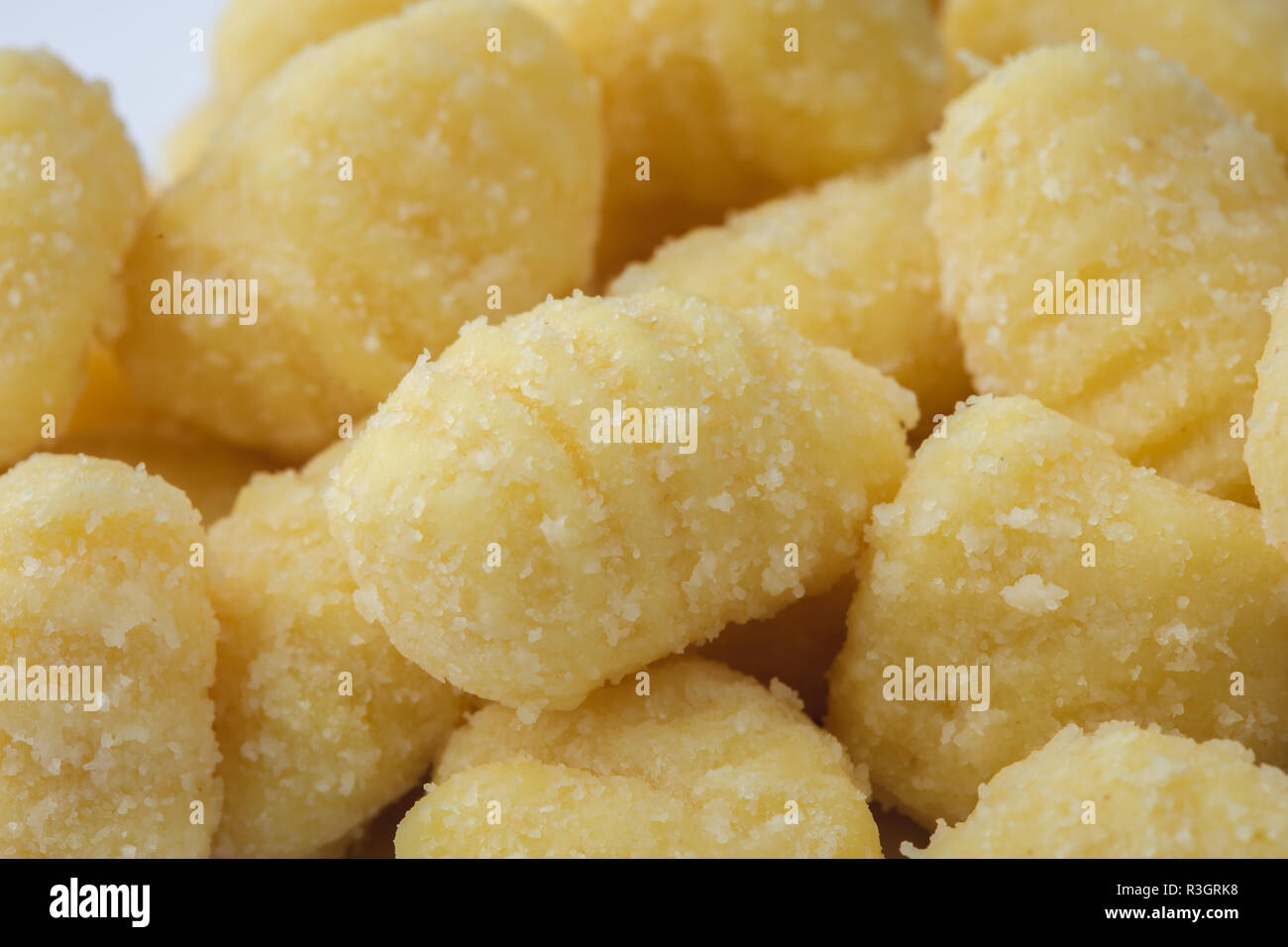 Raw uncooked Gnocchi on white background Stock Photo - Alamy