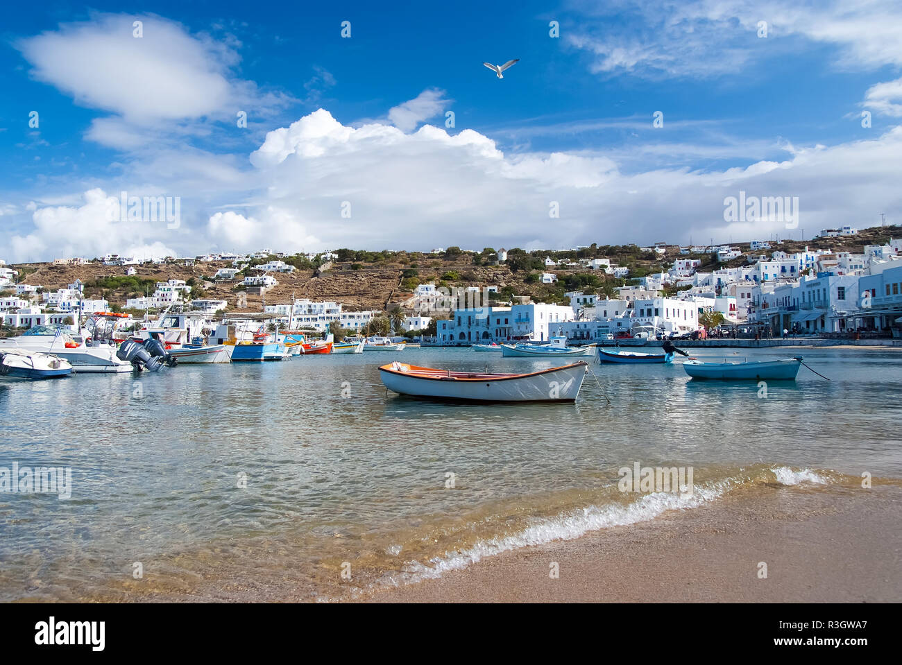 Mykonos, Greece - May 04, 2010: boats at sea beach. Sea coast on cloudy ...
