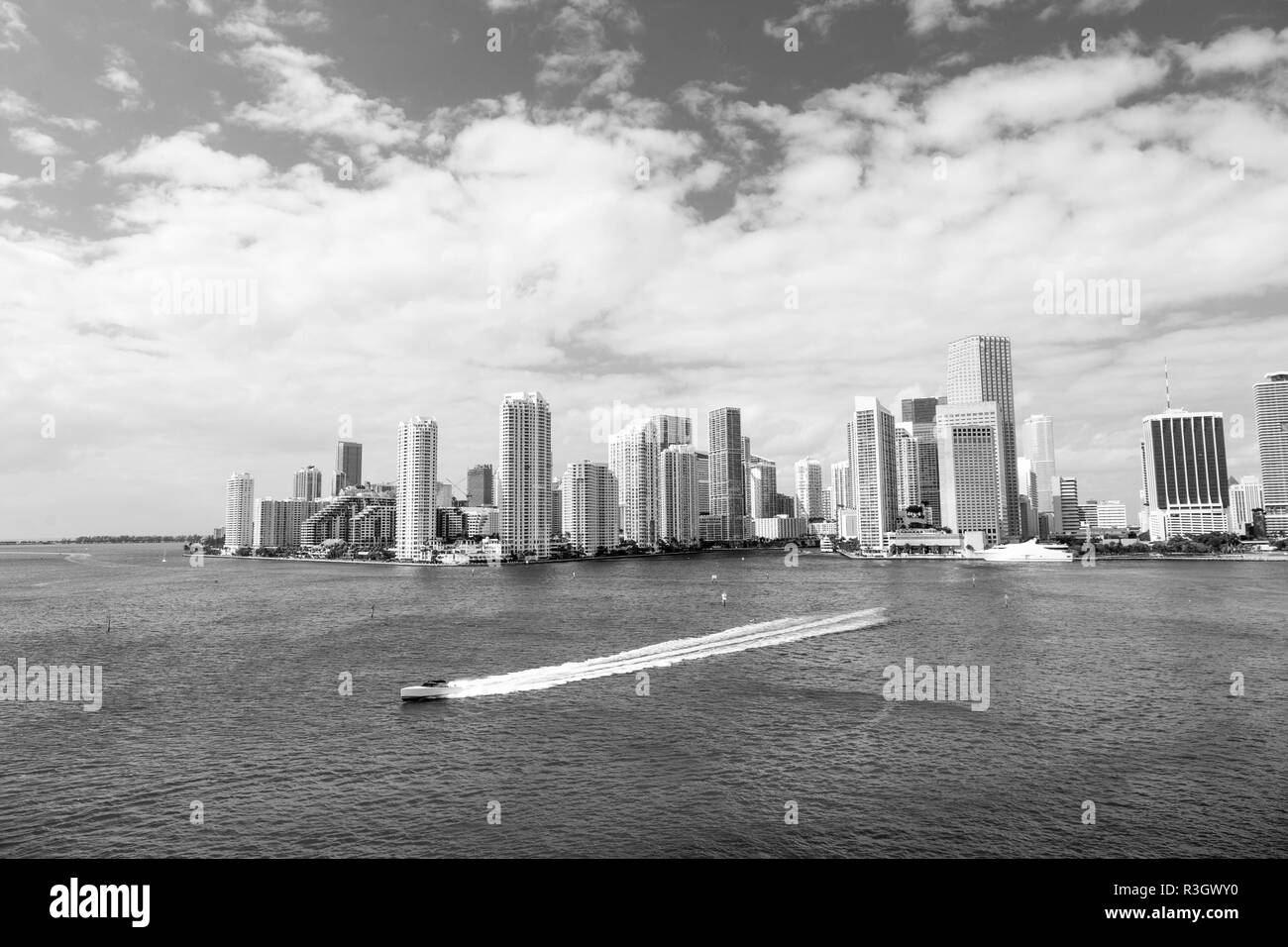 miami skyline. luxury Yachts sail on sea or ocean water to city ...