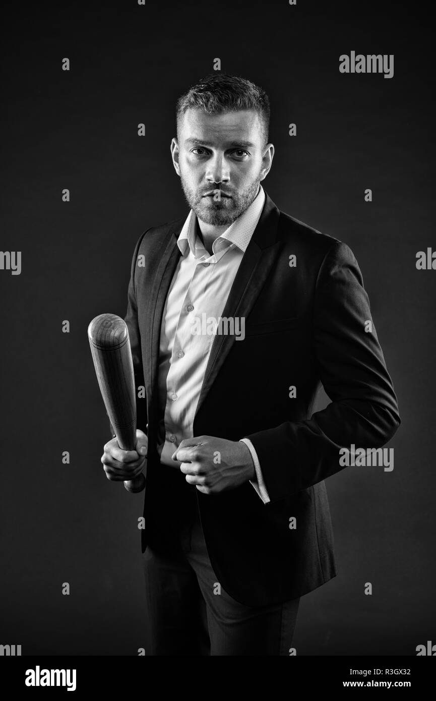 Man with brutal face holding baseball bat. Guy in suit isolated on ...