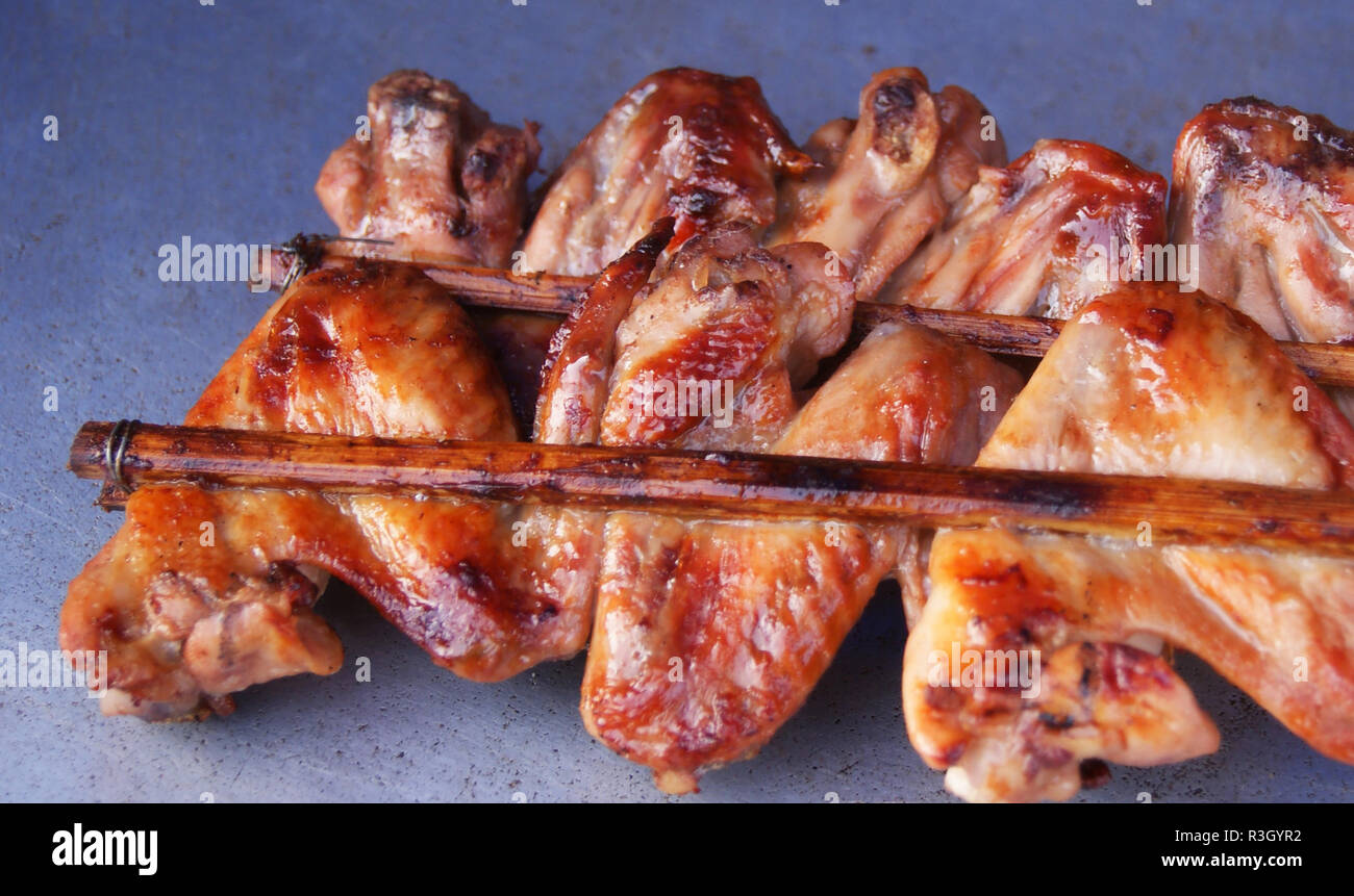 Grilled Chicken Wings Roast Bbq Chicken Wings With Garnish In Bamboo Stick Thai Style Chicken