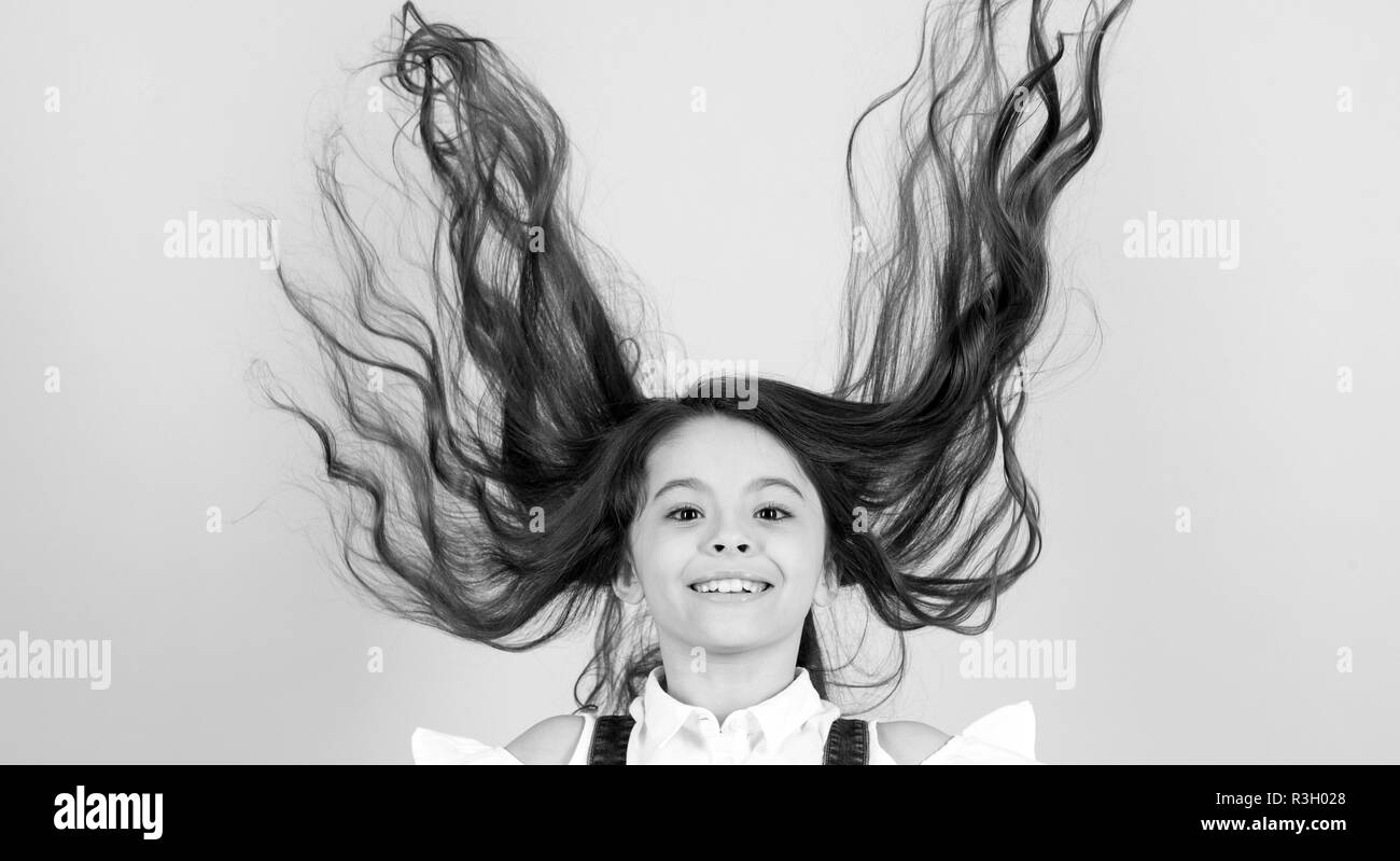 Hairdresser salon for girls concept. Hairdresser child model smile with ...