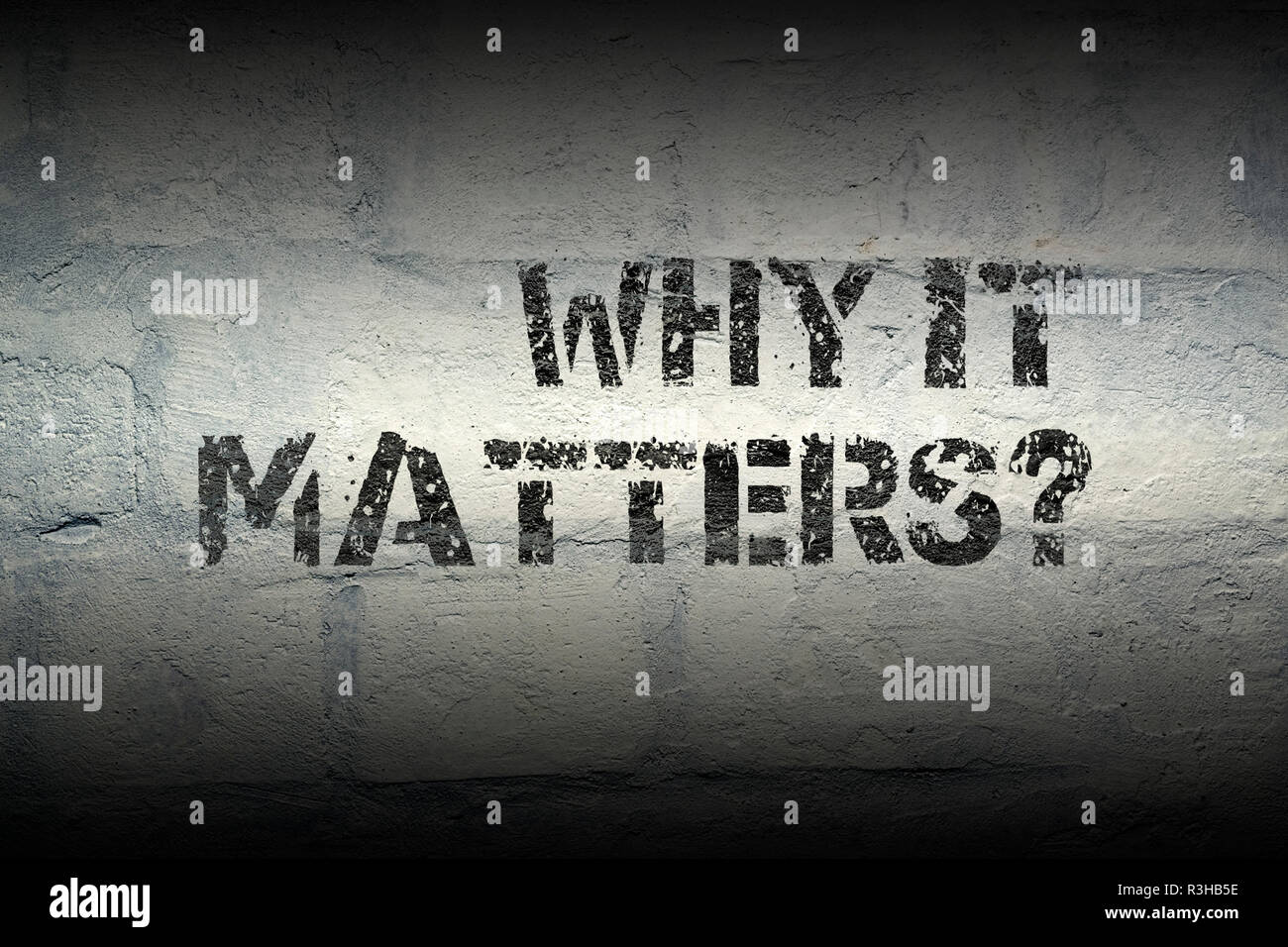 why it matters question stencil print on the grunge white brick wall ...