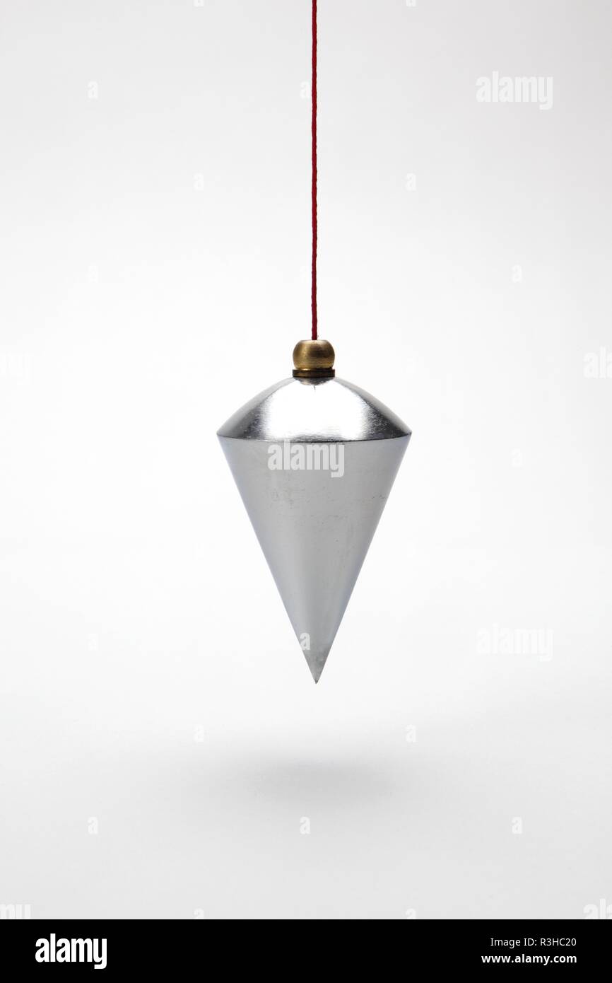 vertical plumb on white background Stock Photo - Alamy