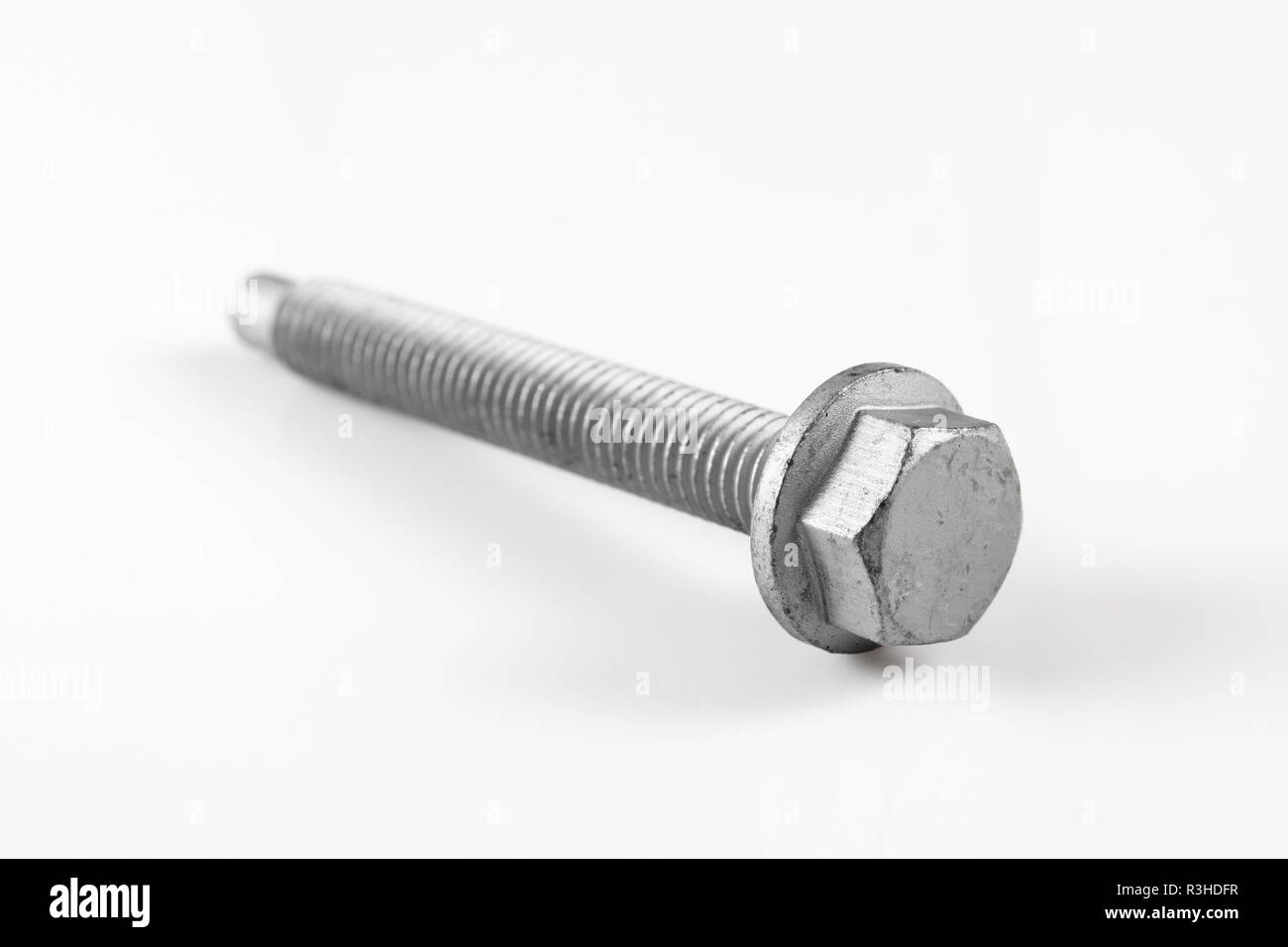 Crankshaft Bolt. Isolated on white background Stock Photo - Alamy