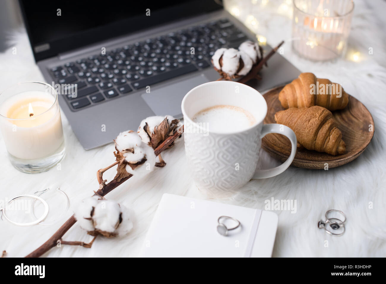 Lady bloggers white work place with business details, laptop, coffee ...