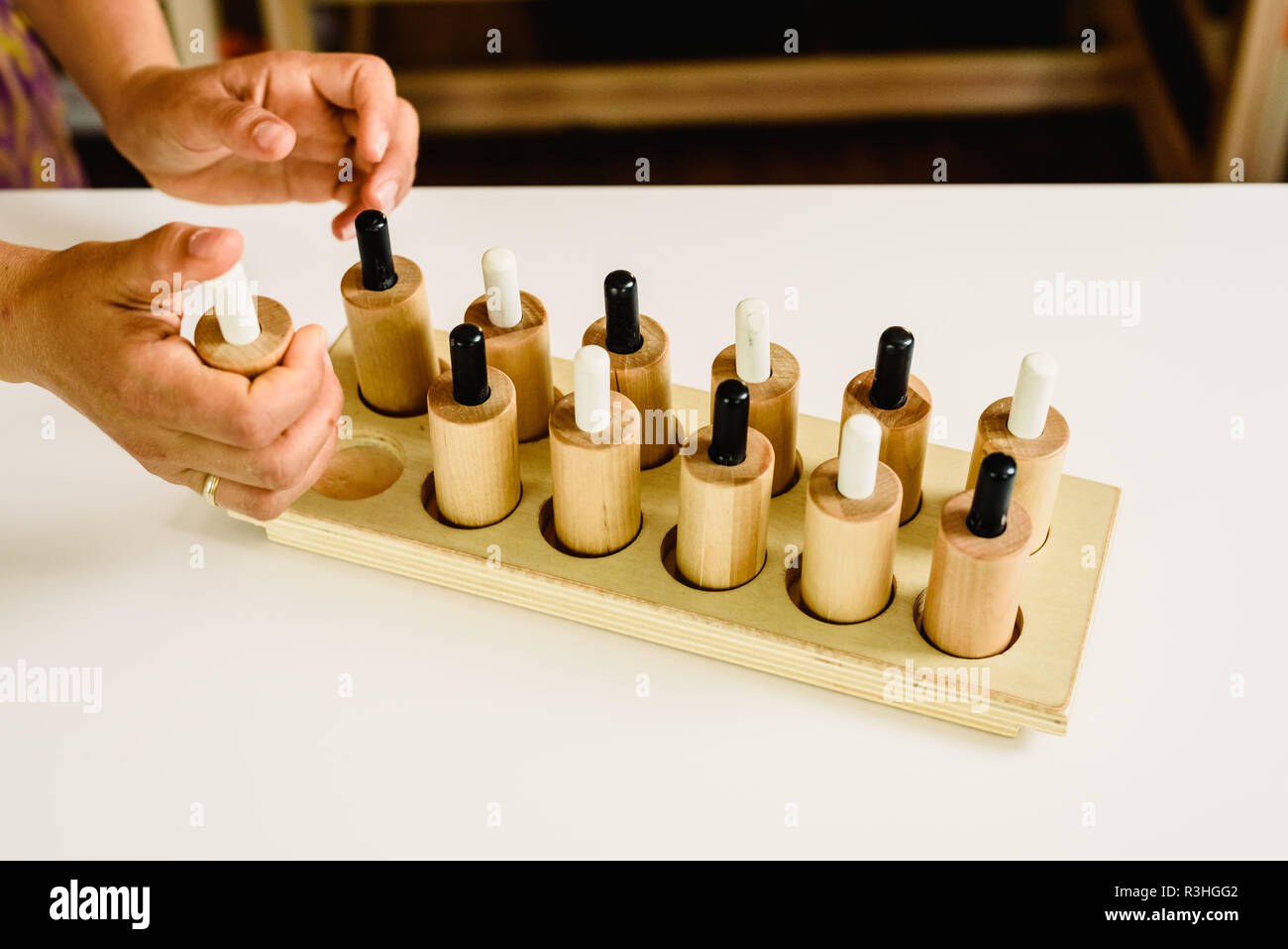 Wooden push-buttons in a montessori classroom pulsed by the teacher to ...
