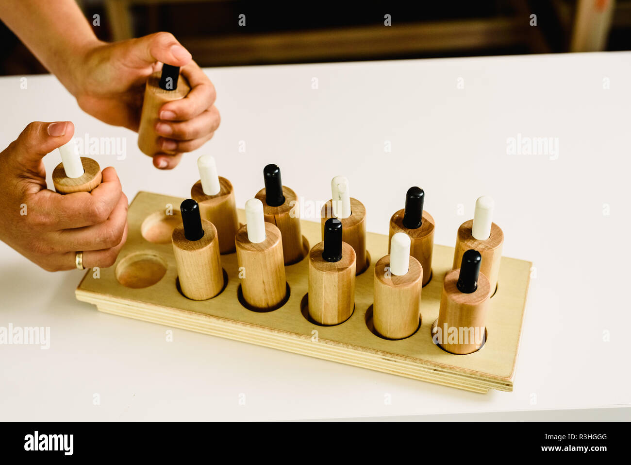 Wooden push-buttons in a montessori classroom pulsed by the teacher to ...