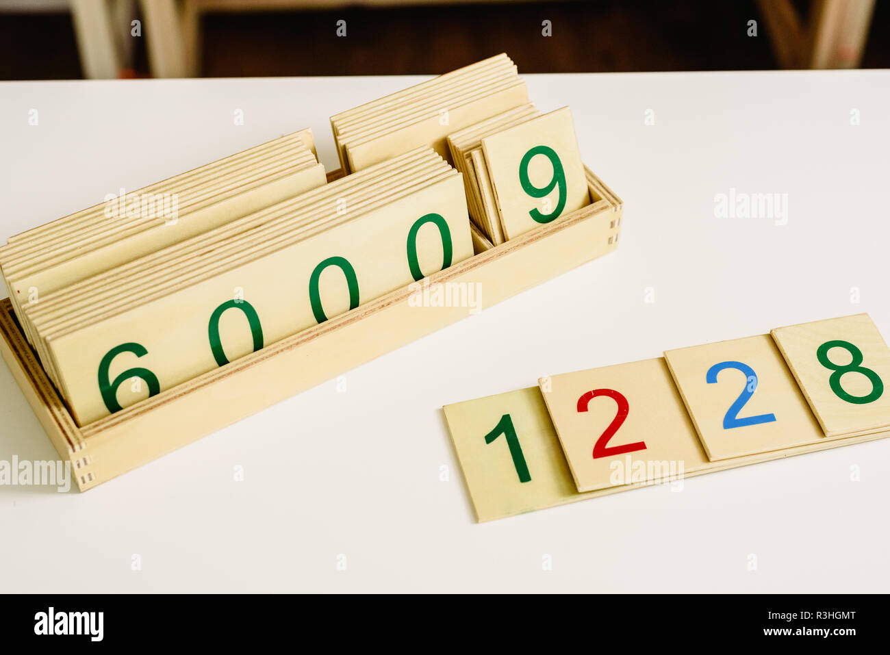 Wooden numbers in tables to learn mathematics in a Montessori classroom ...