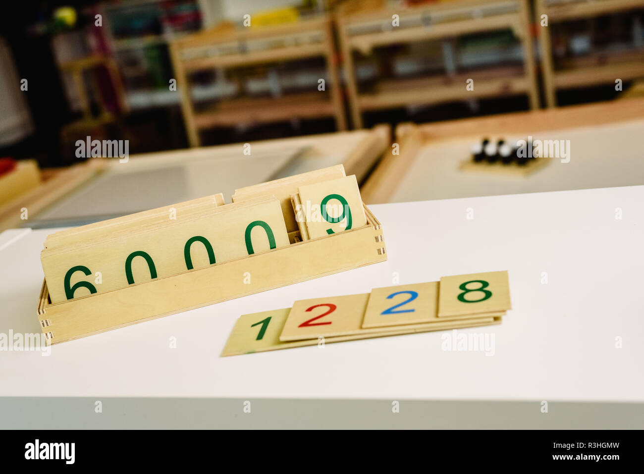 Wooden numbers in tables to learn mathematics in a Montessori classroom ...