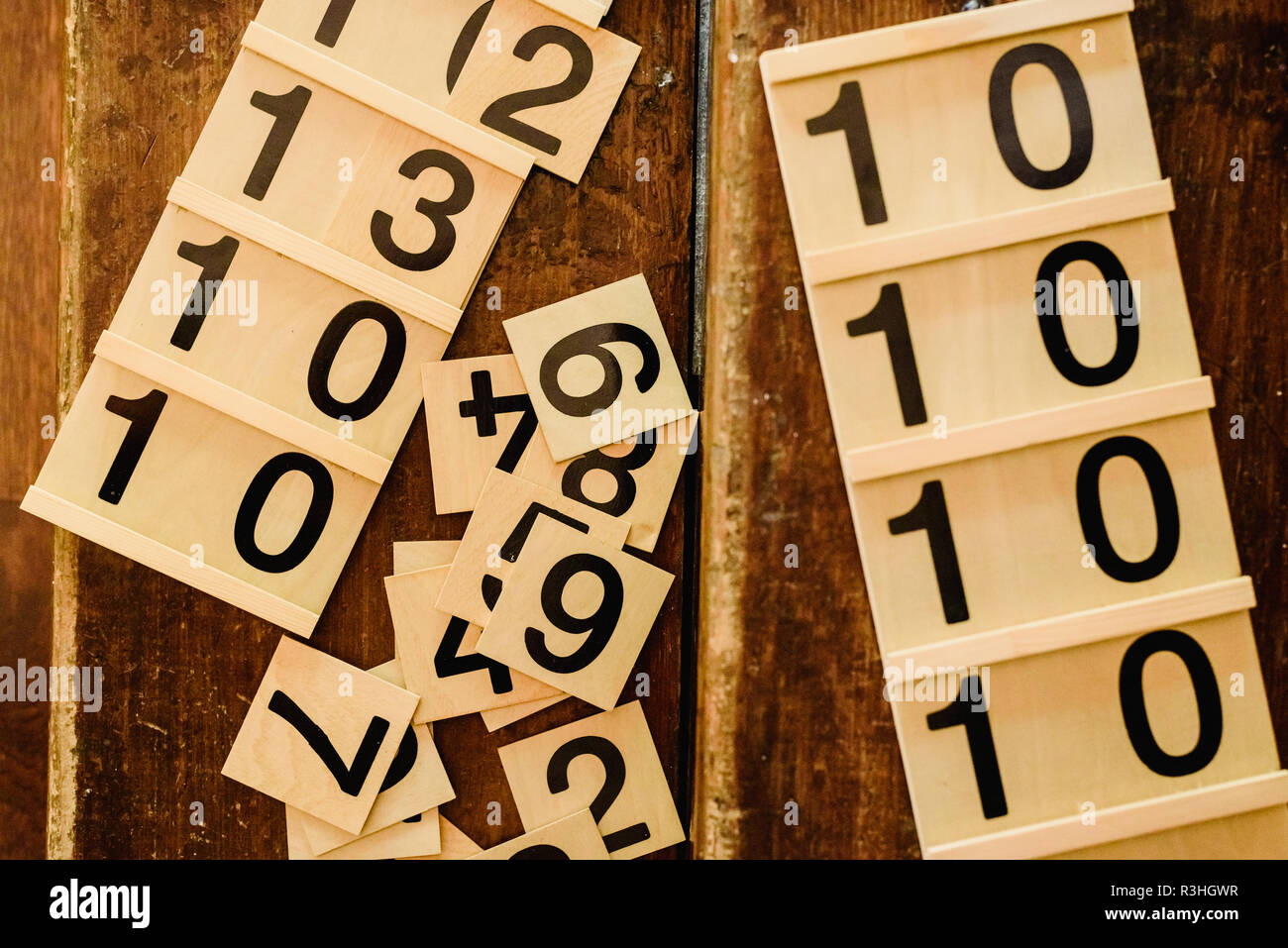 Wooden numbers in tables to learn mathematics in a Montessori classroom ...