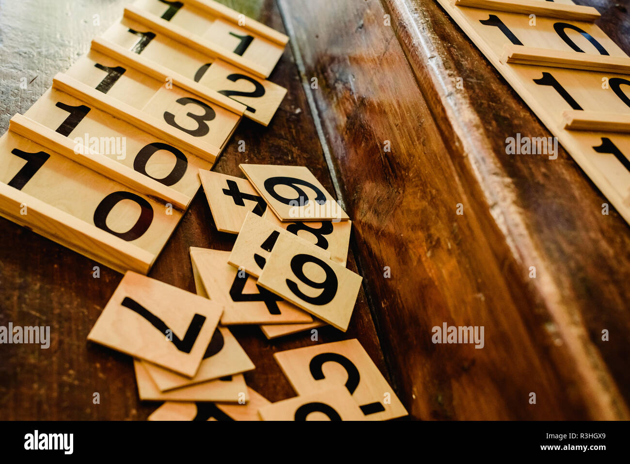 Wooden numbers in tables to learn mathematics in a Montessori classroom ...
