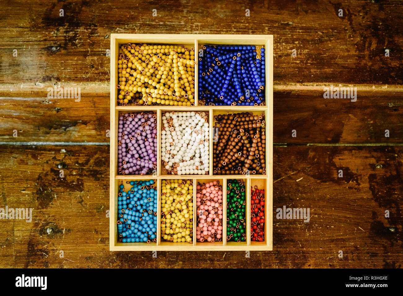 Color bead stairs, counting in a montessori classroom Stock Photo - Alamy