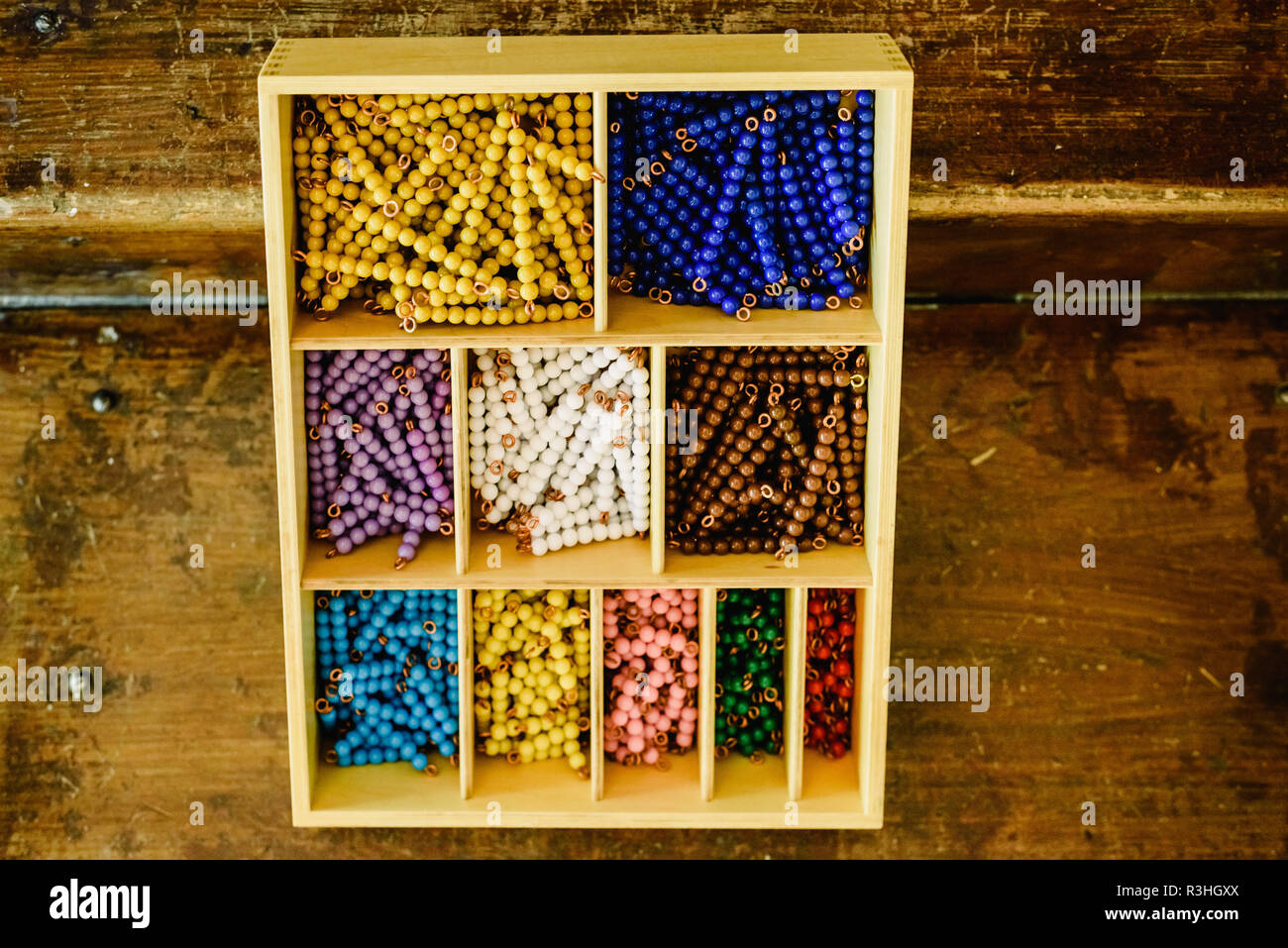 Color bead stairs, counting in a montessori classroom Stock Photo - Alamy