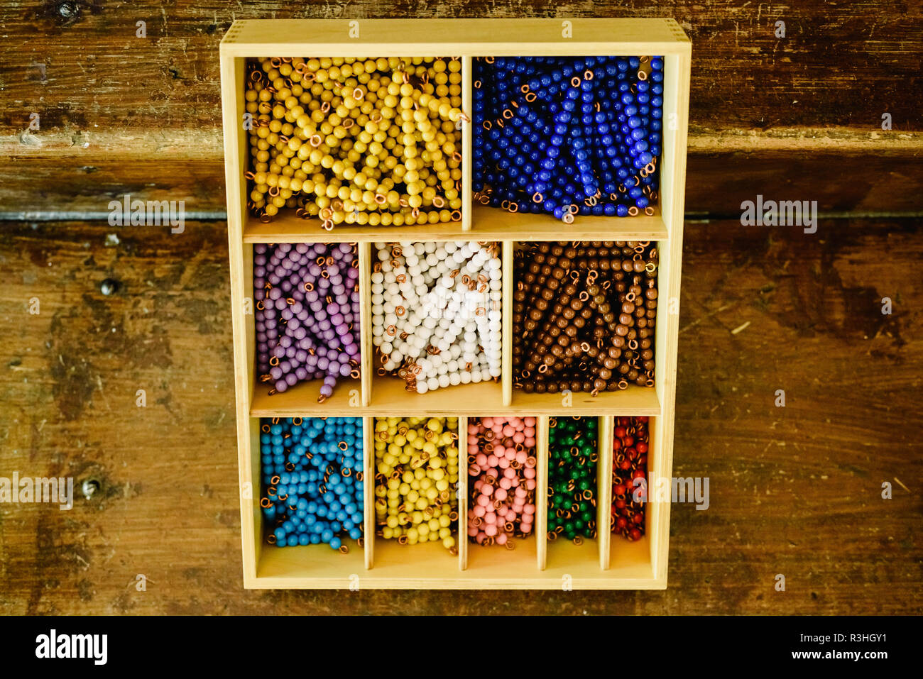 Color bead stairs, counting in a montessori classroom Stock Photo - Alamy