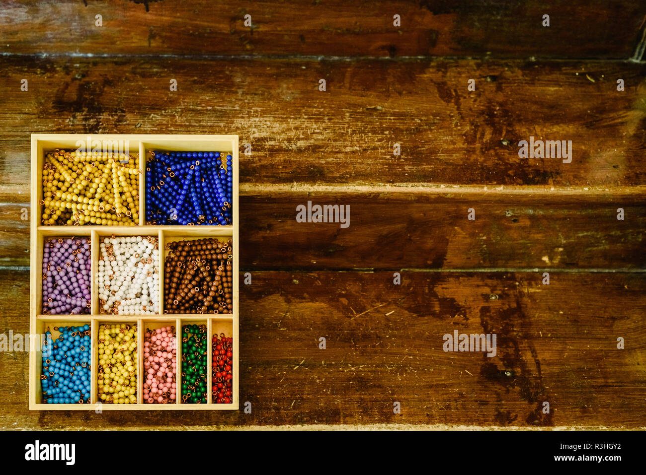 Color bead stairs, counting in a montessori classroom Stock Photo - Alamy