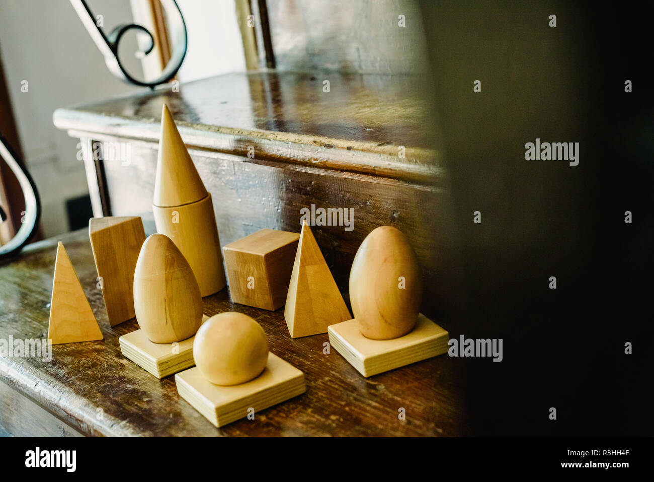 Solid wood shapes to study geometry and volumes, cones, triangles ...