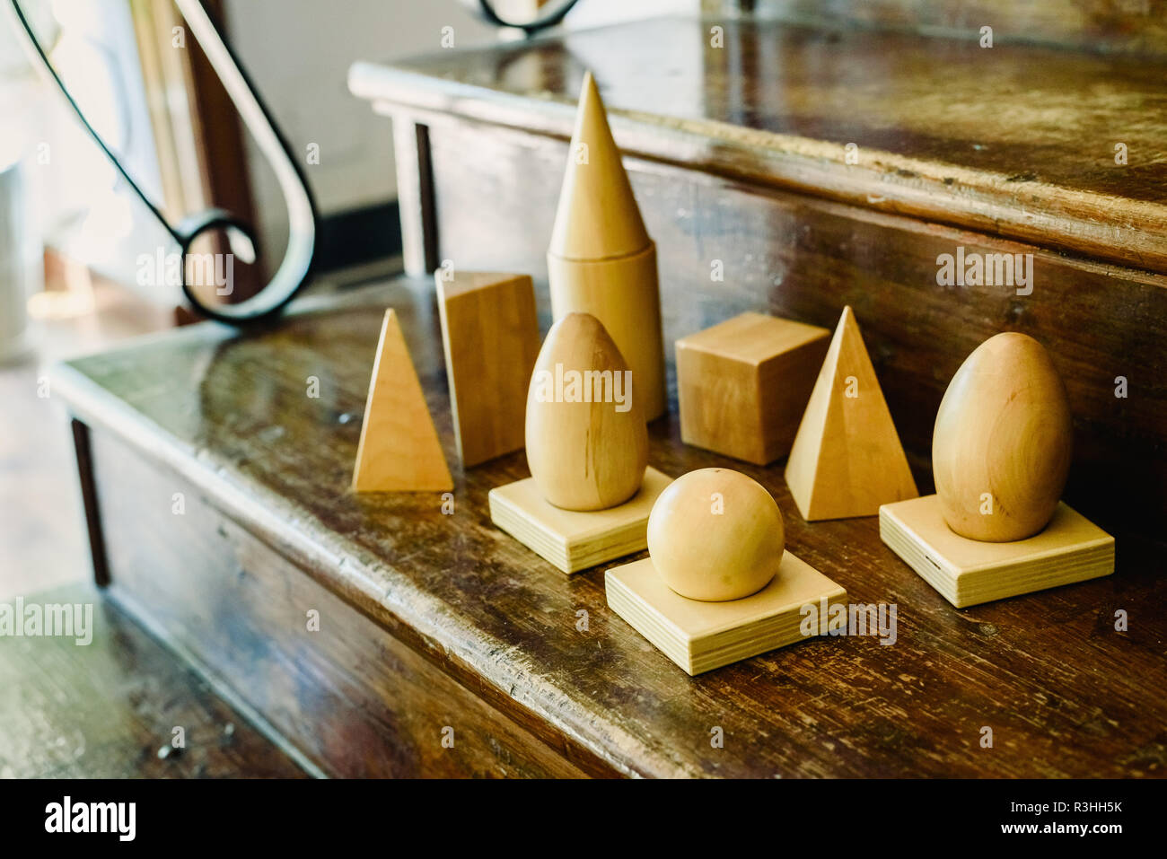 Solid wood shapes to study geometry and volumes, cones, triangles ...