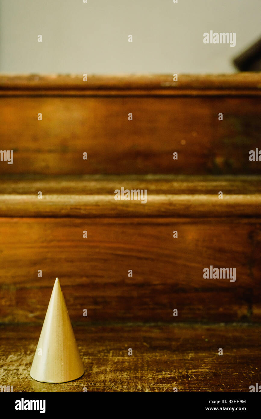 Cone shapes of solid wood to study geometry Stock Photo - Alamy