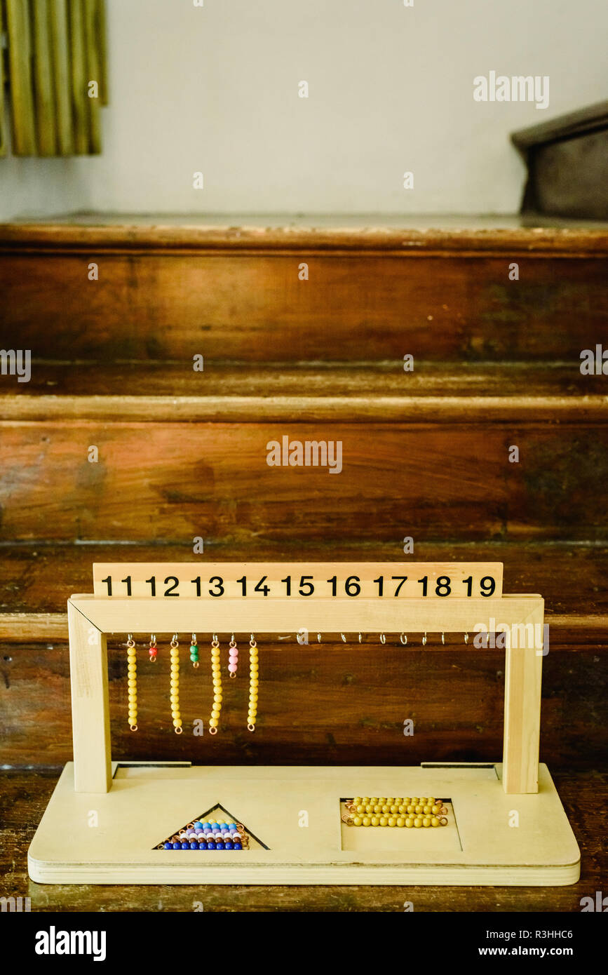 Hanger for color bead stairs, counting in a montessori classroom Stock ...