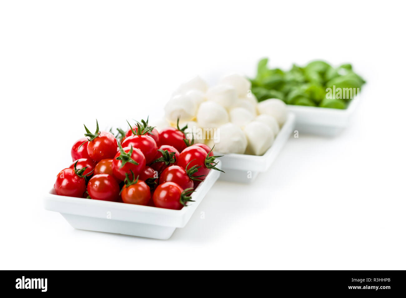 Fresh basil tomatoes salt Cut Out Stock Images & Pictures - Alamy