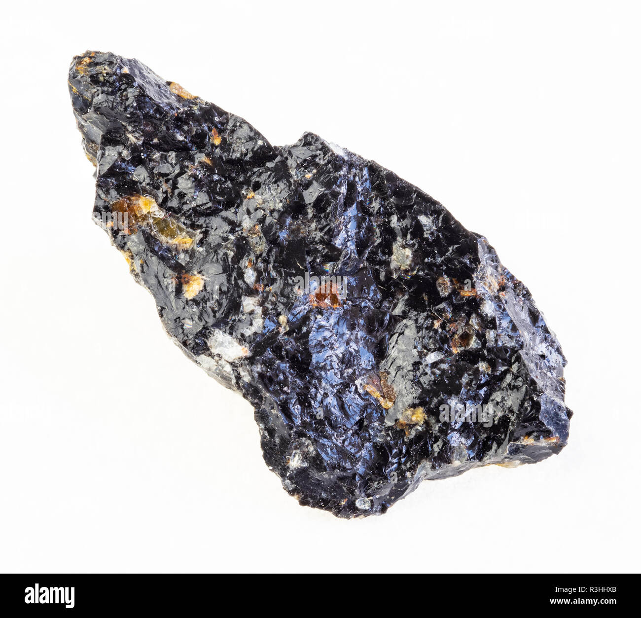 macro photography of natural mineral from geological collection - rough obsidian (volcanic glass ...