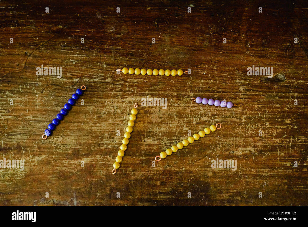 Beams to learn to count in a montessori classroom on aged wood Stock ...