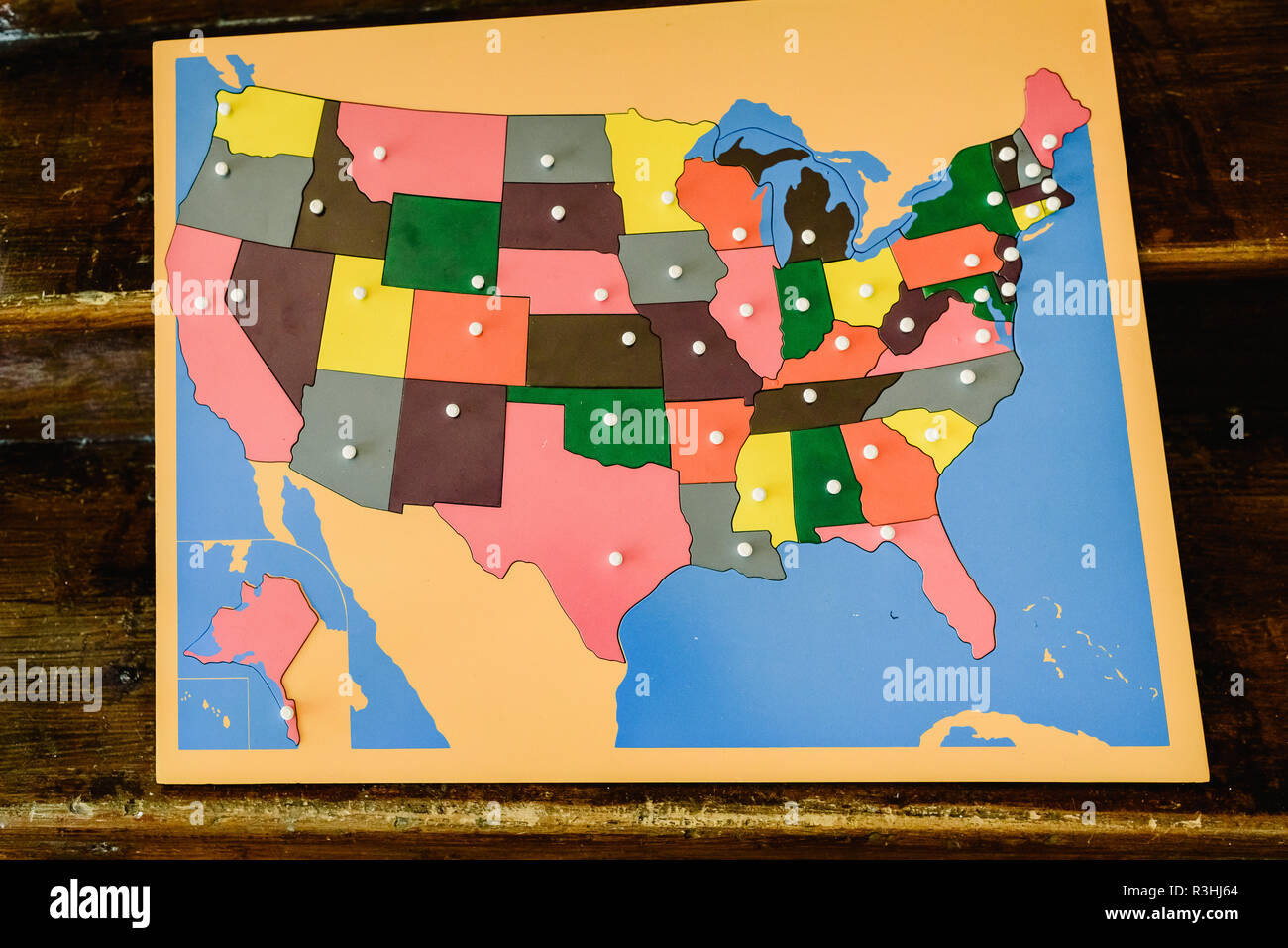 Puzzle with map of the states of the United States of America in a ...