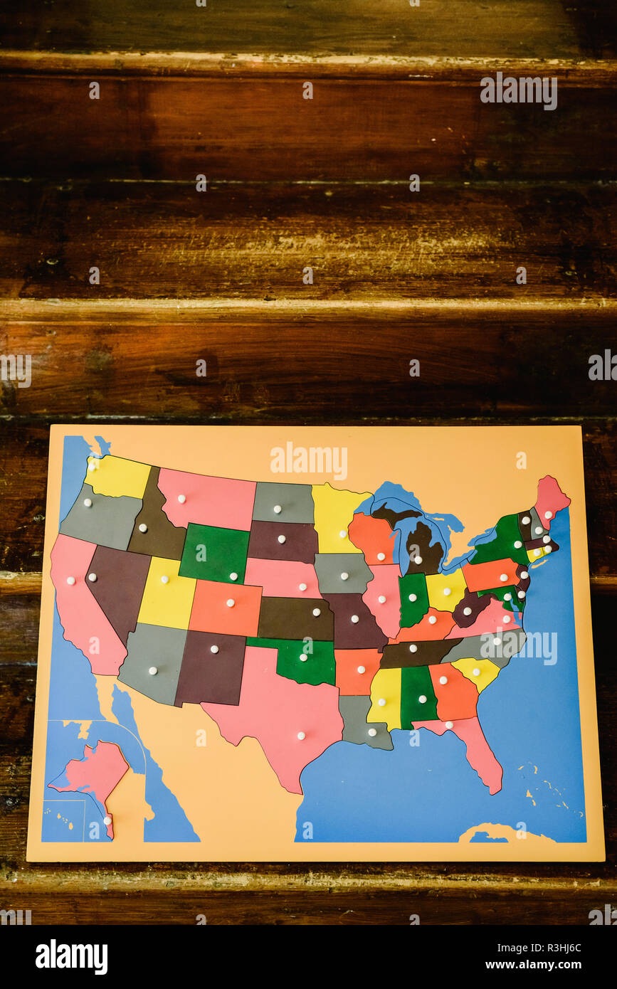 Puzzle with map of the states of the United States of America in a ...