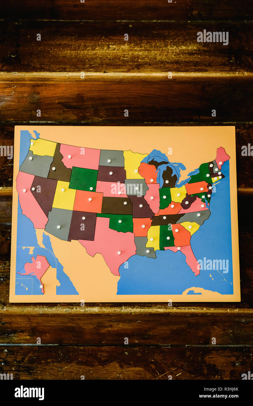 Puzzle with map of the states of the United States of America in a ...